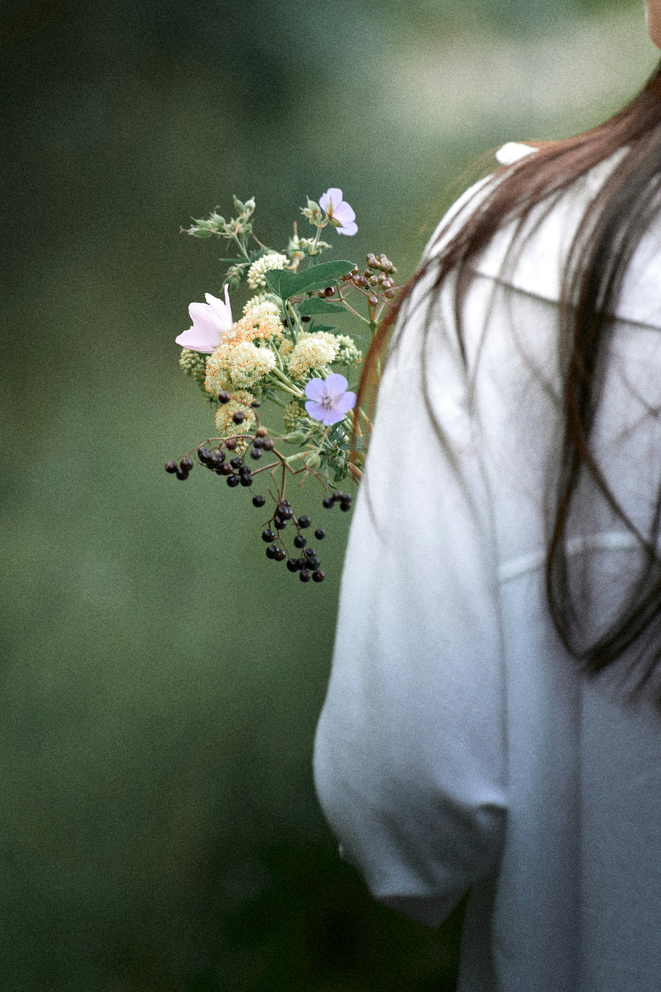 Bouquet at the Shoulder: Wildflowers and a Quiet Boundary