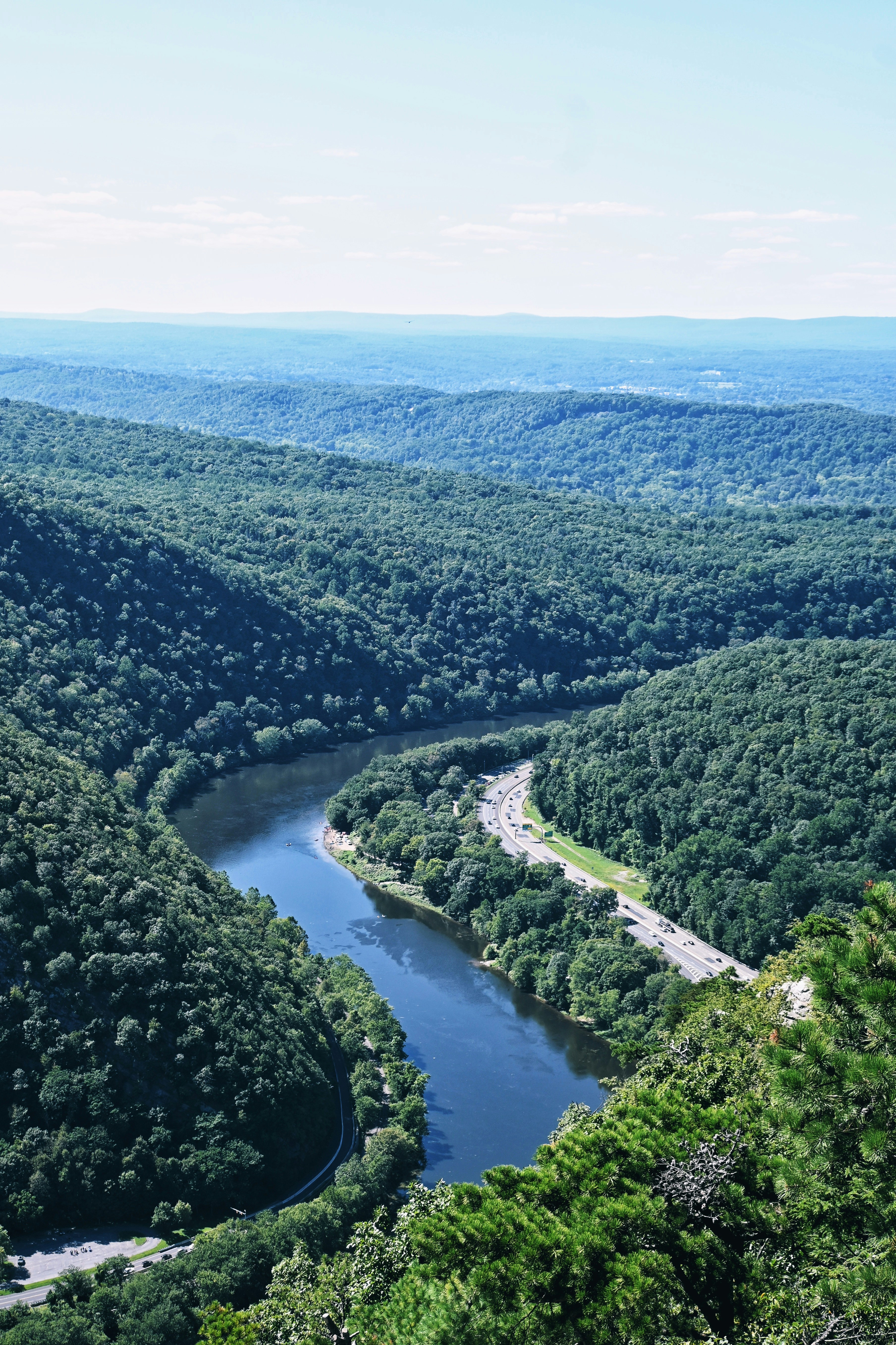 River Meanders Through a Carved Green Canyon