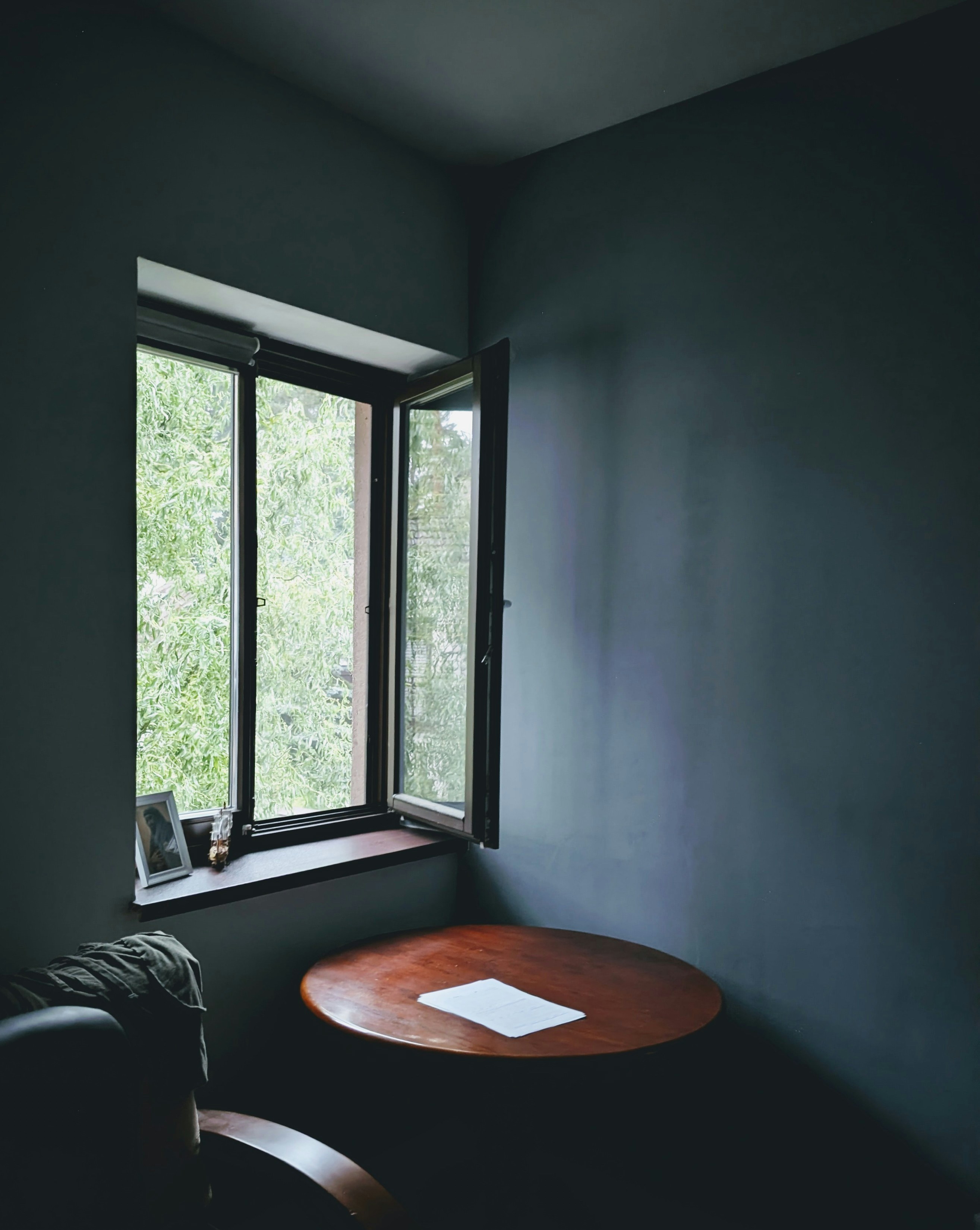 Sunlit Corner Window with Round Table