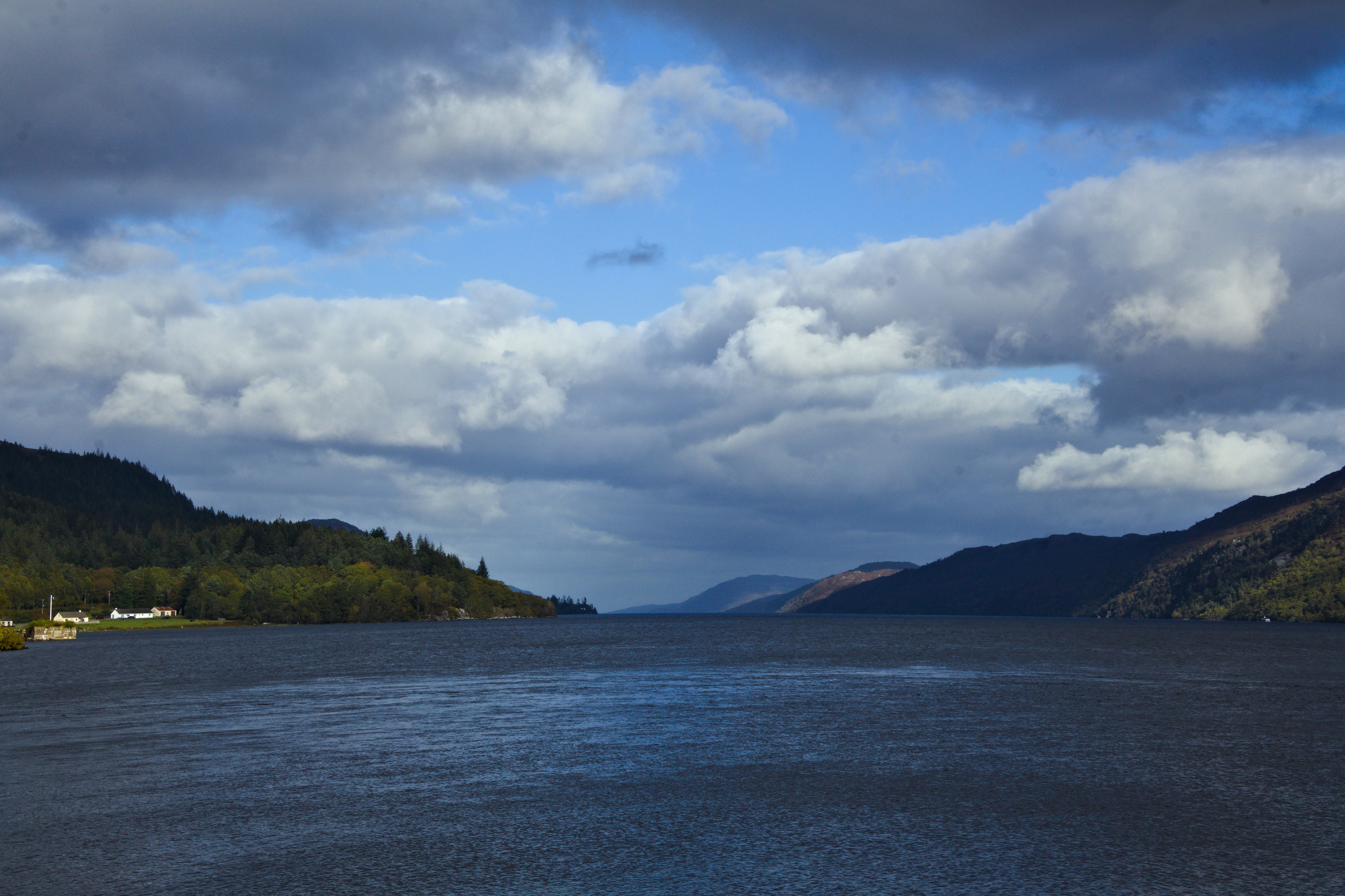 Wide River Vale at Dusk: Hills, Clouds and Calm Water