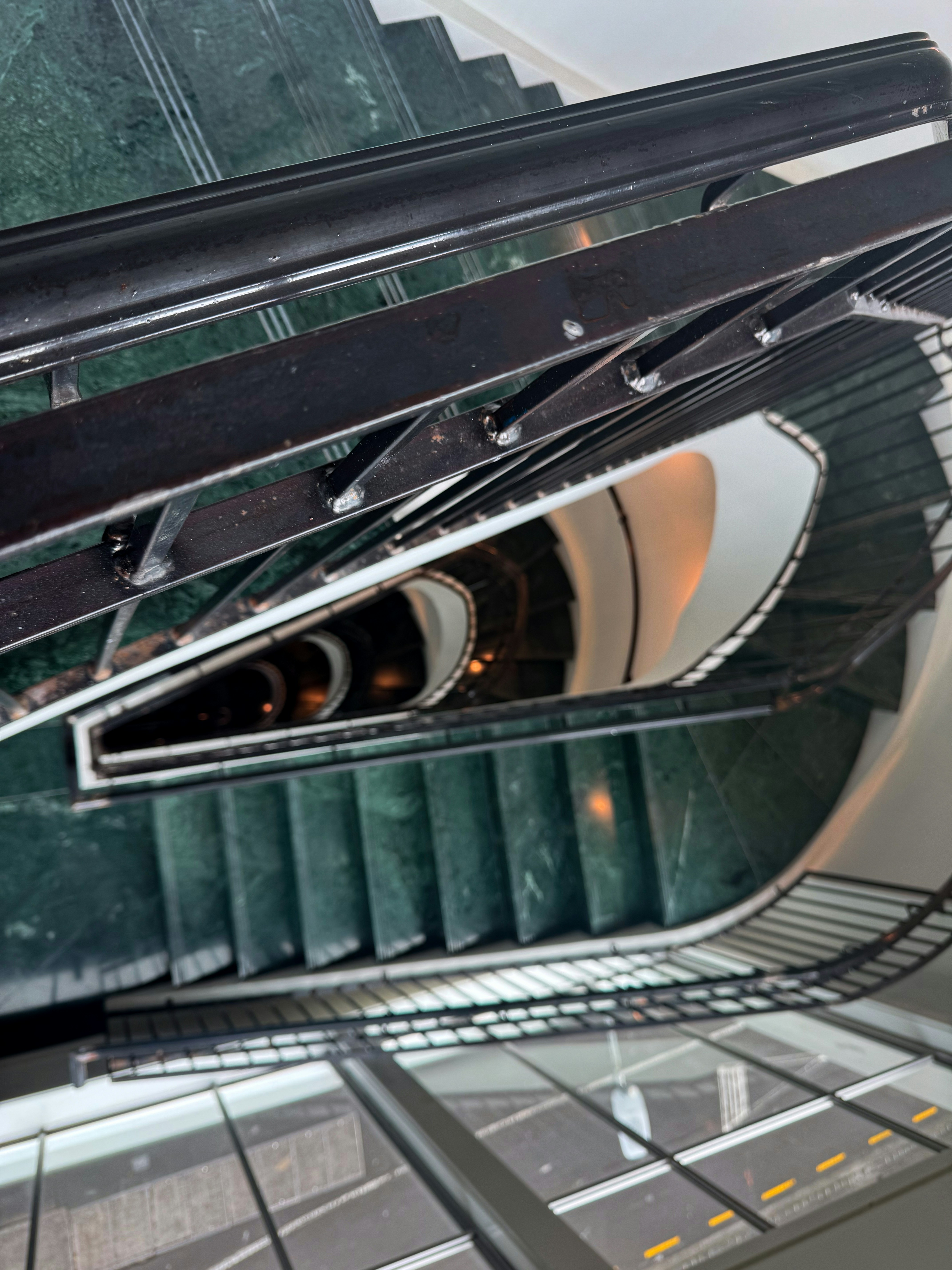 Aerial descent: spiraling staircase viewed from a tilted angle