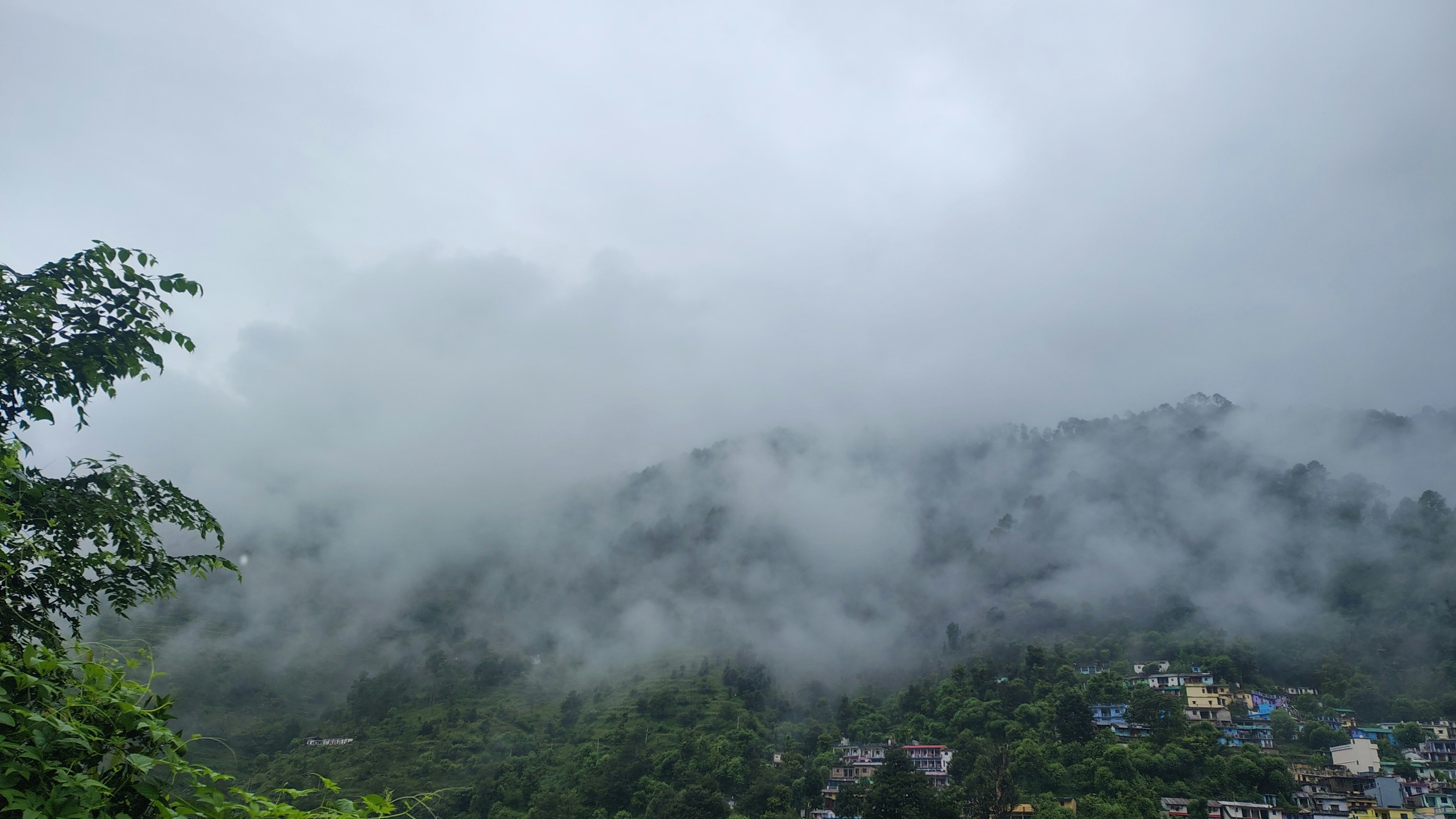 Mist Veil over the Hills: A Quiet Valley Transformed by Clouds