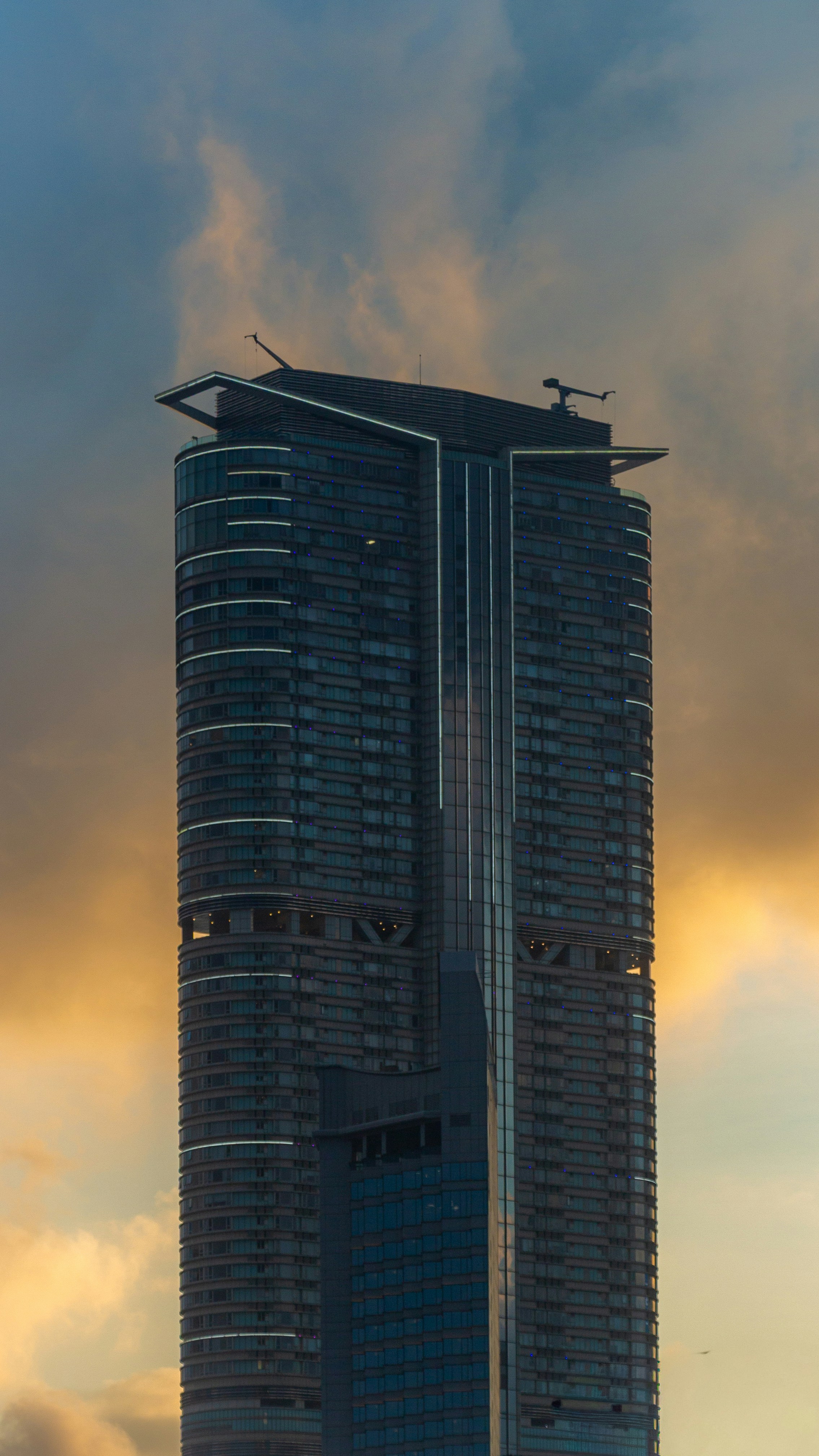 Skyward Prism: The Jeweled Tower Against a Dusk Canvas