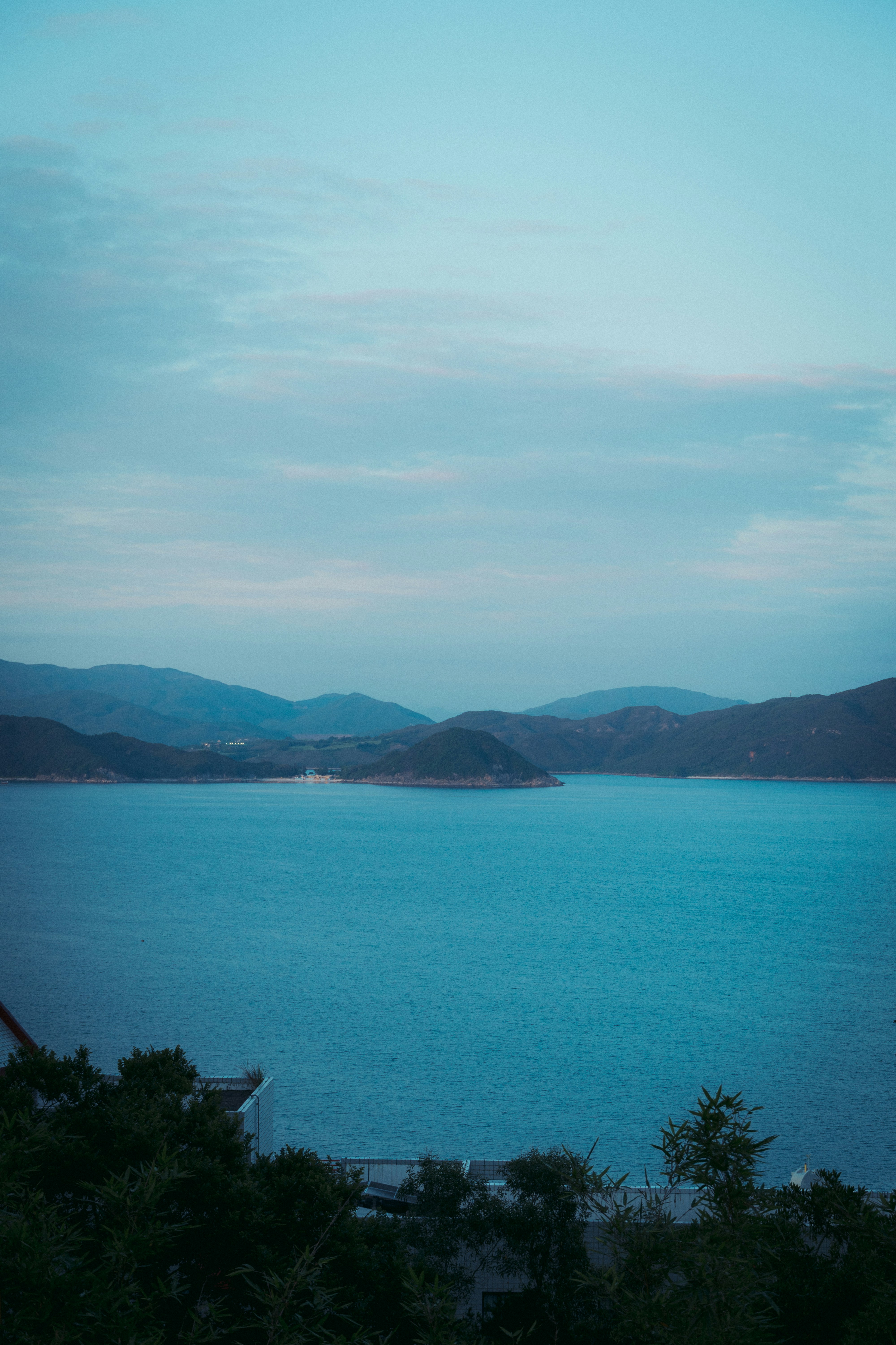 Calm Sea, Distant Islands: A Blue Hour Panorama