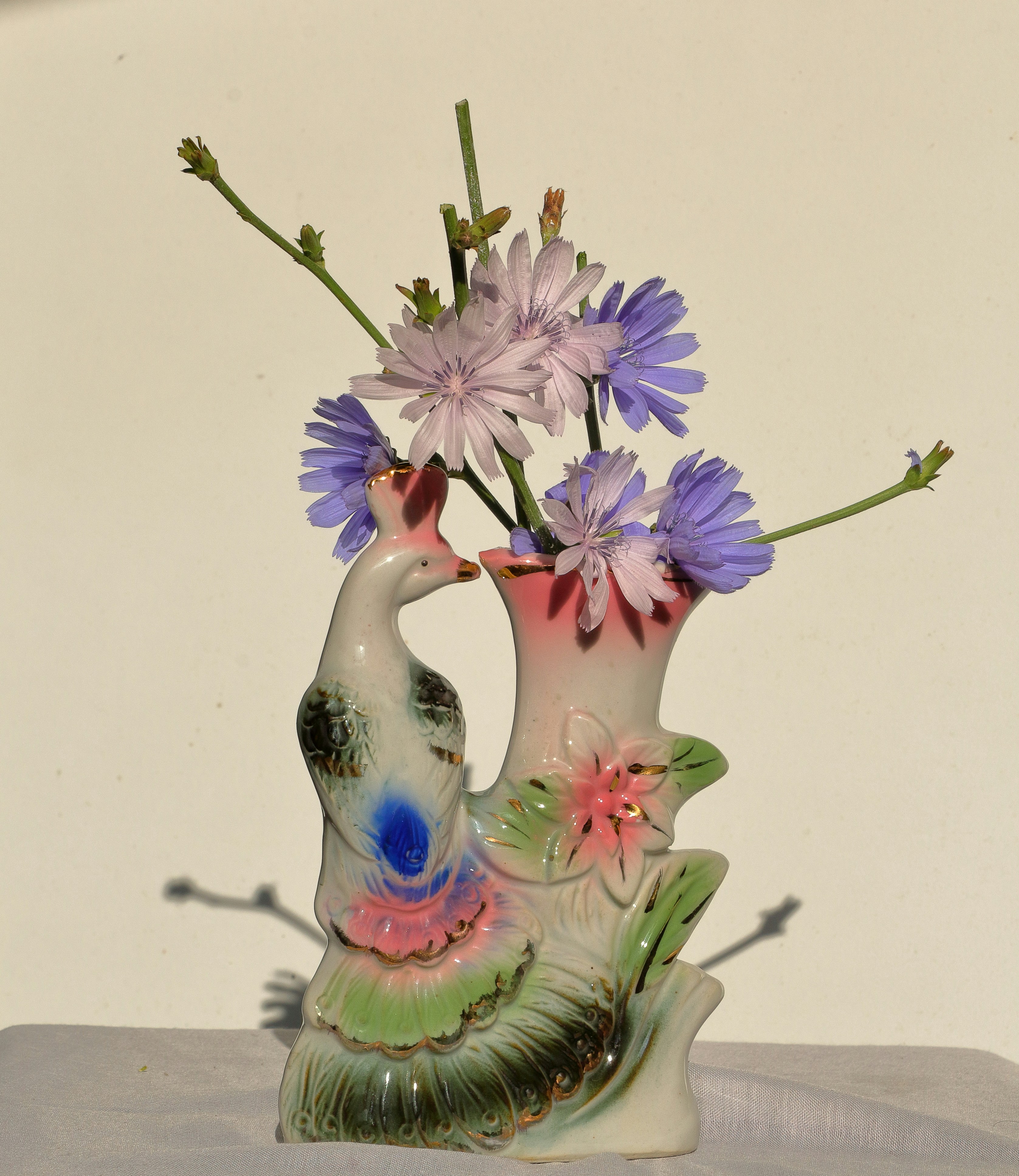 Duet in Porcelain: Two Birds Crafting a Blooming Bouquet