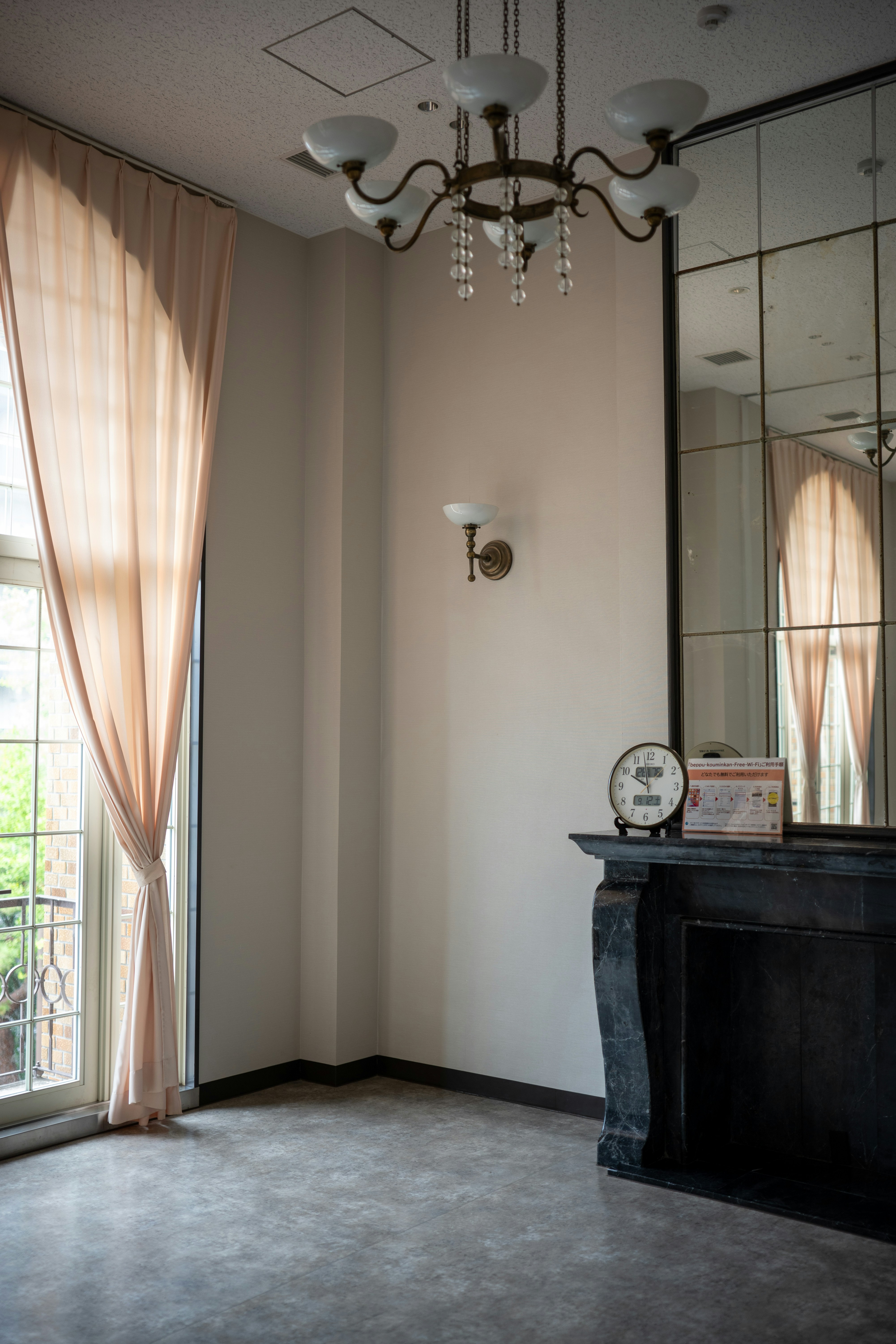 Elegant Corner with Marble Mantel and Soft Peach Drapes