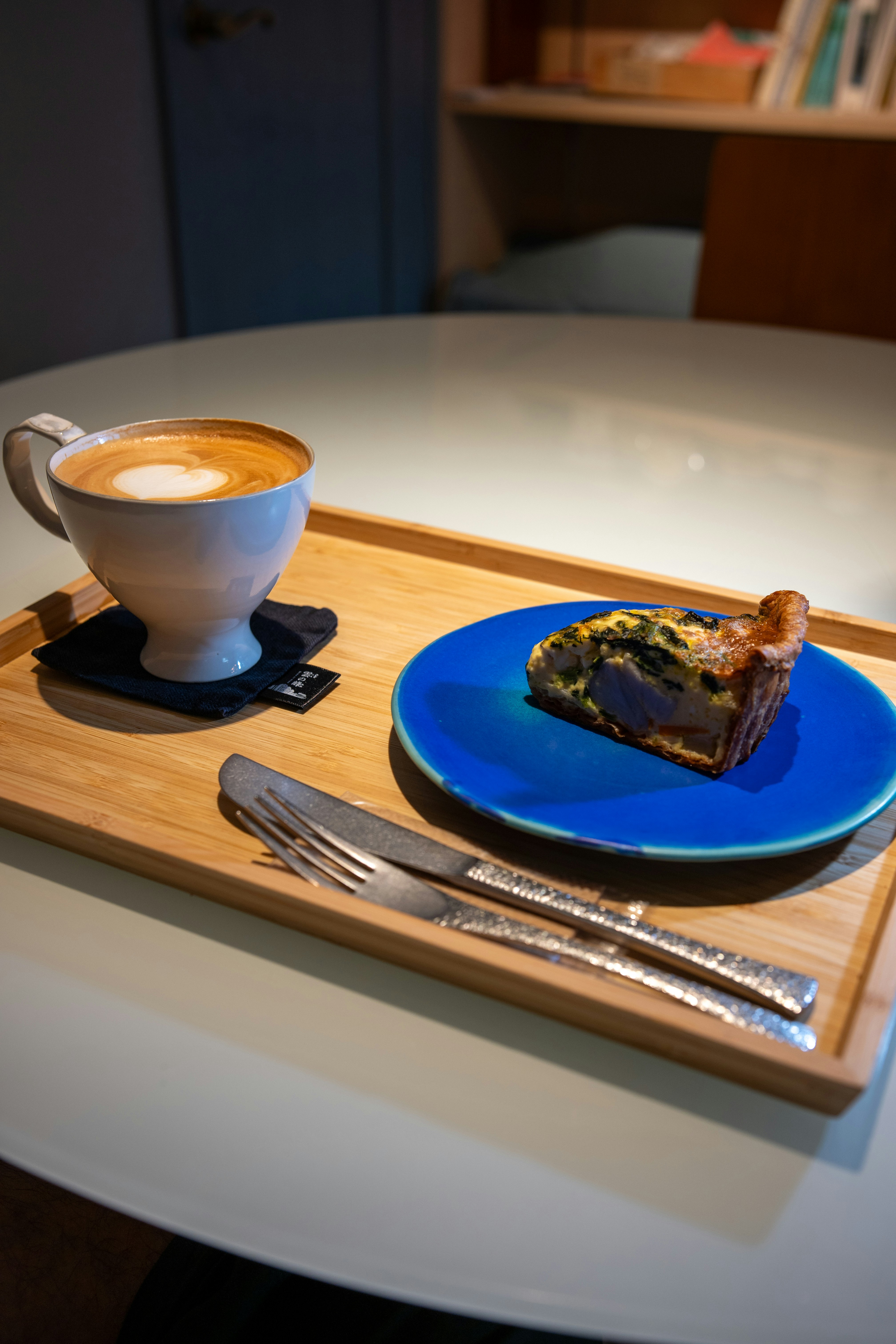 Cafe Tray: Latte, Crest of Crust, and a Slice of Creamy Delight