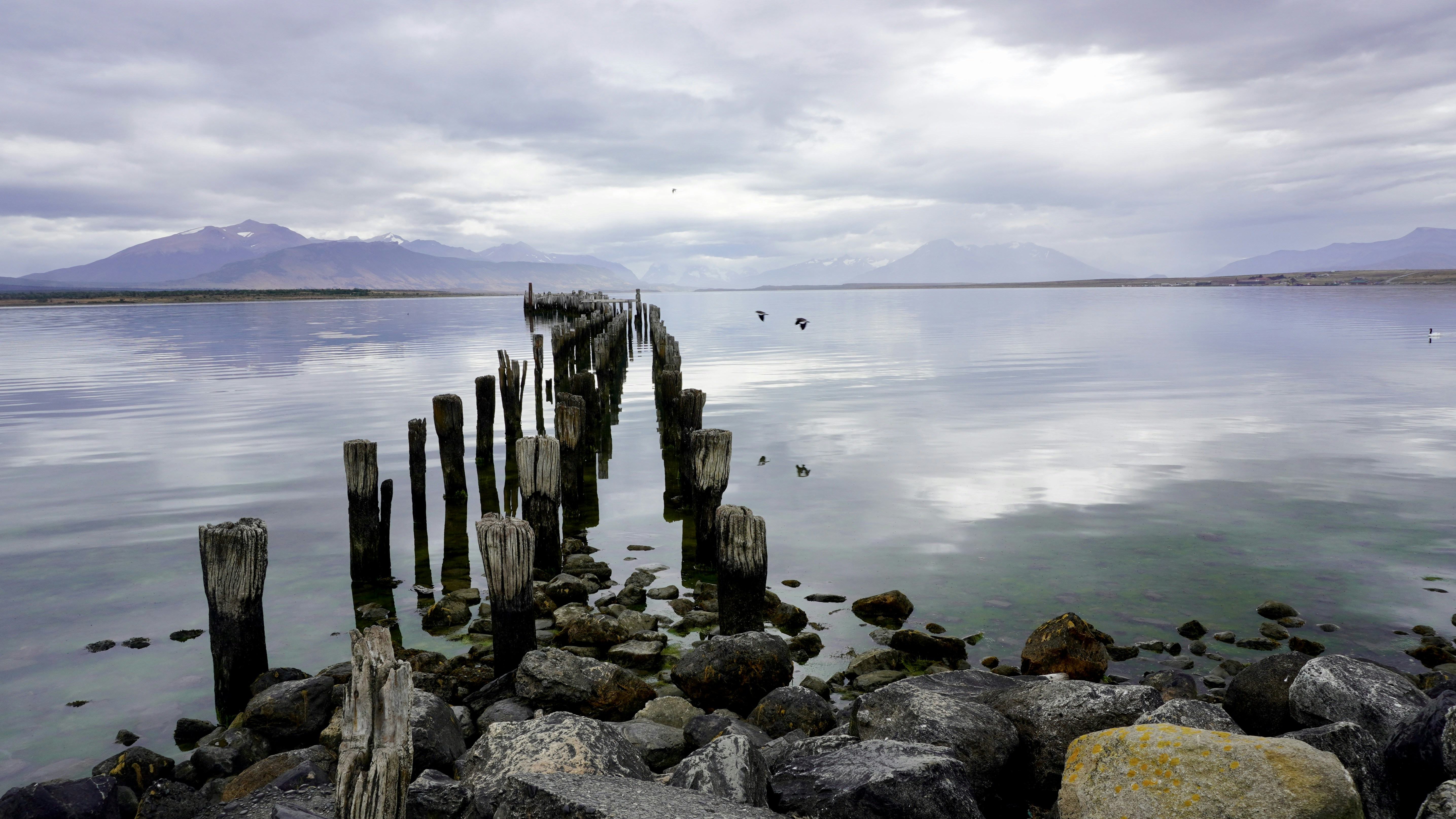 Echoes of the Pier: Stones, Water, and Sky