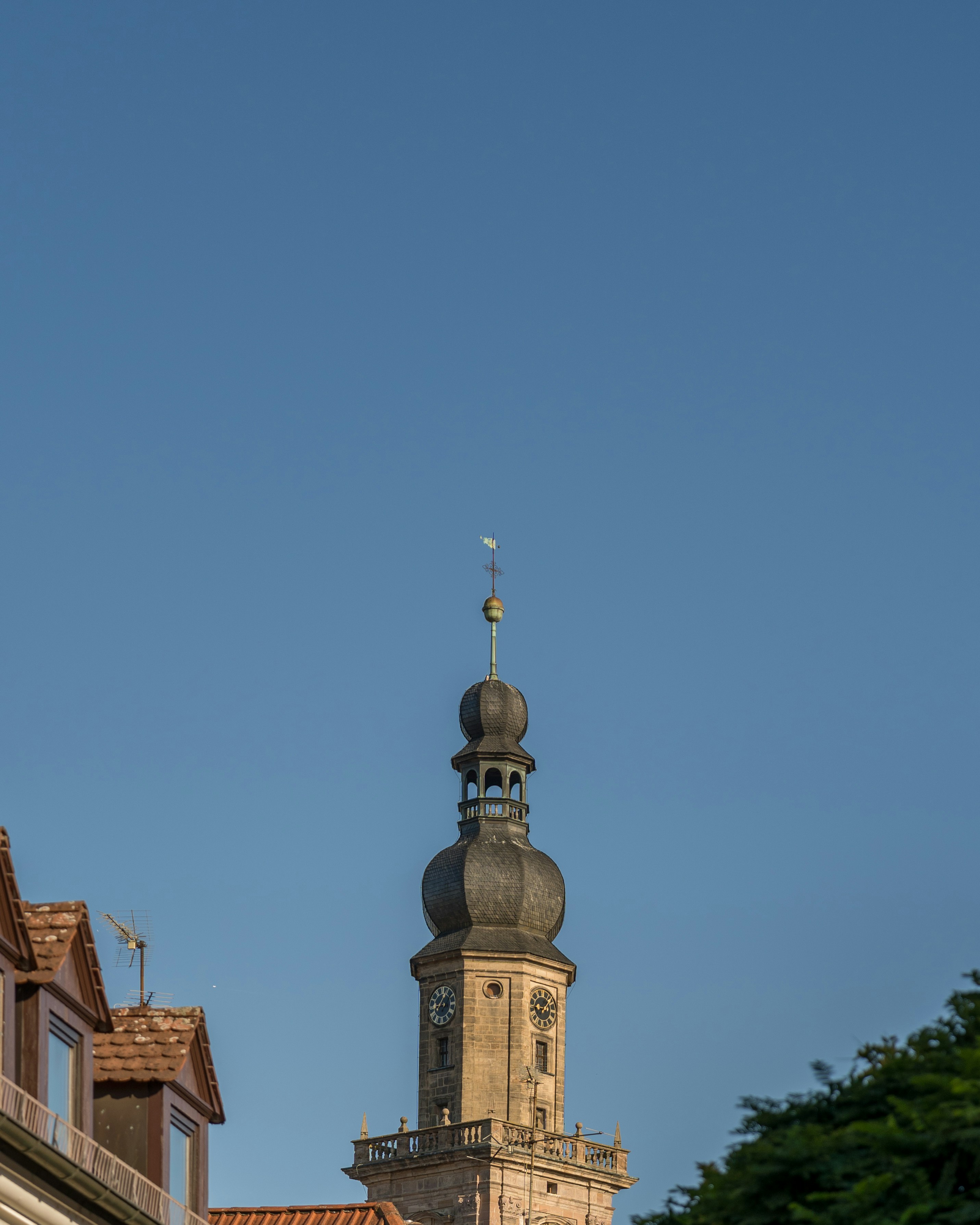 Bell-towered silhouette under a clear sky