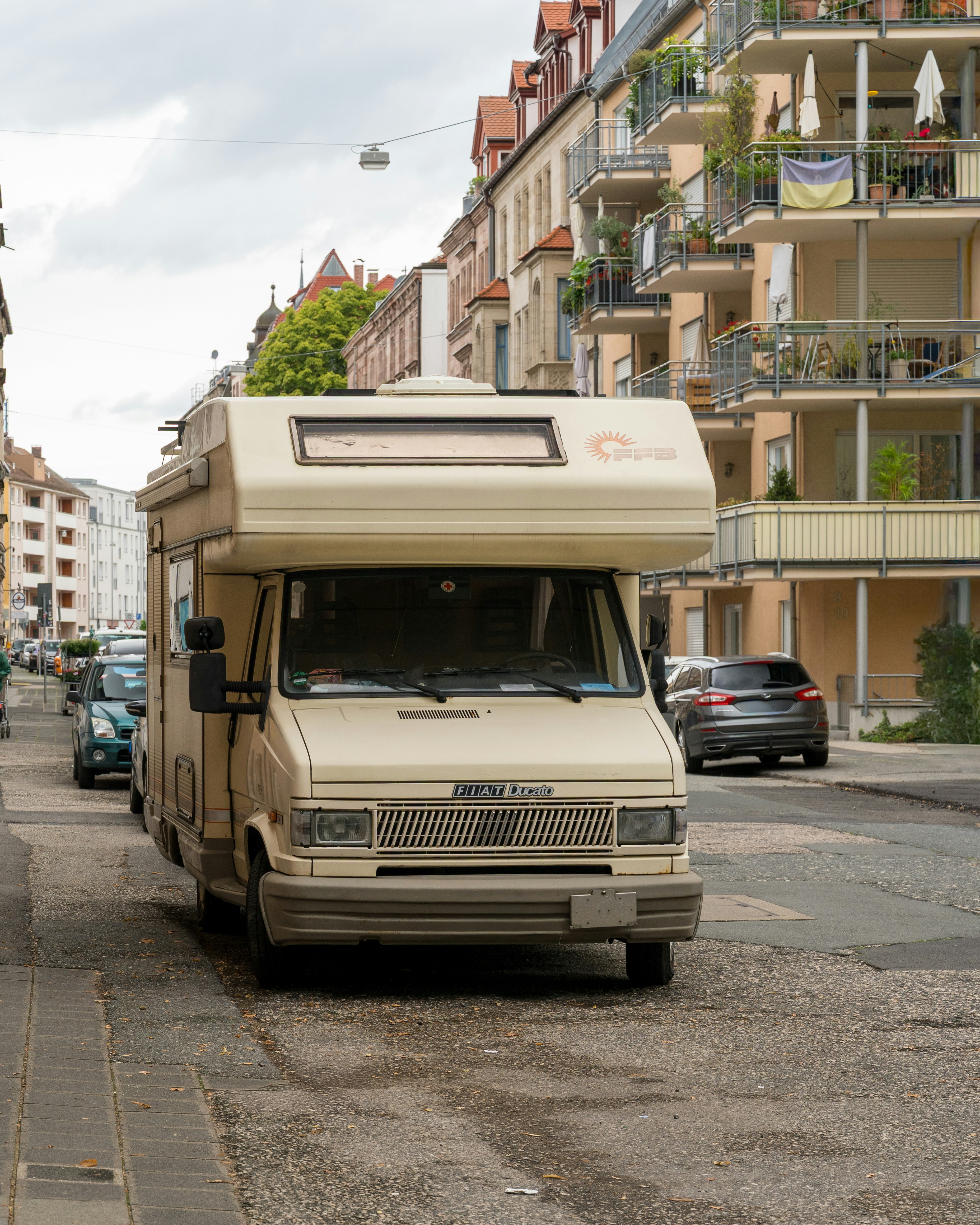 Urban Wanderer: A Campervan on a Quiet City Street