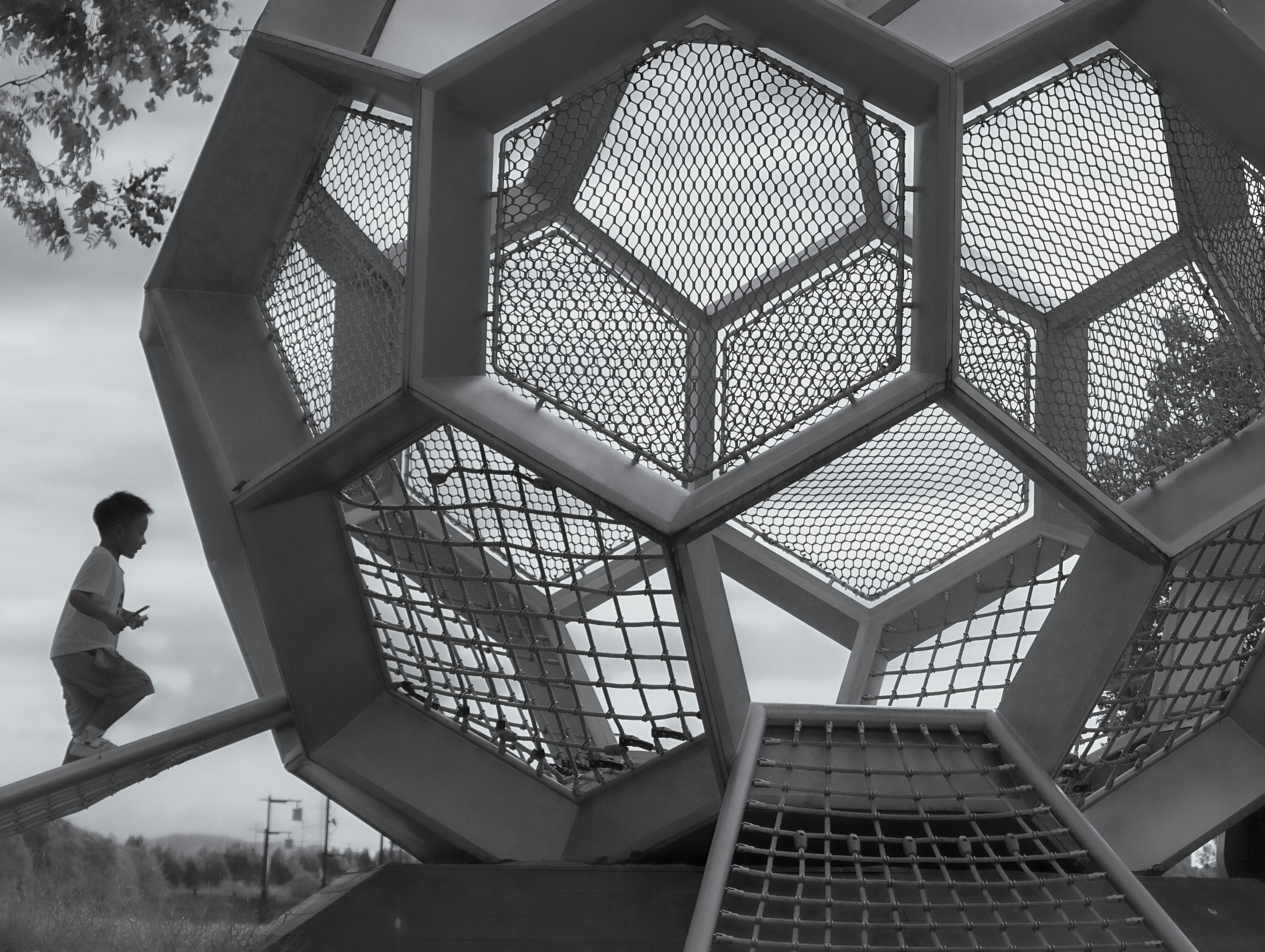 Hexa-Frame Runner: A Boy Crossing the Steel Orbit