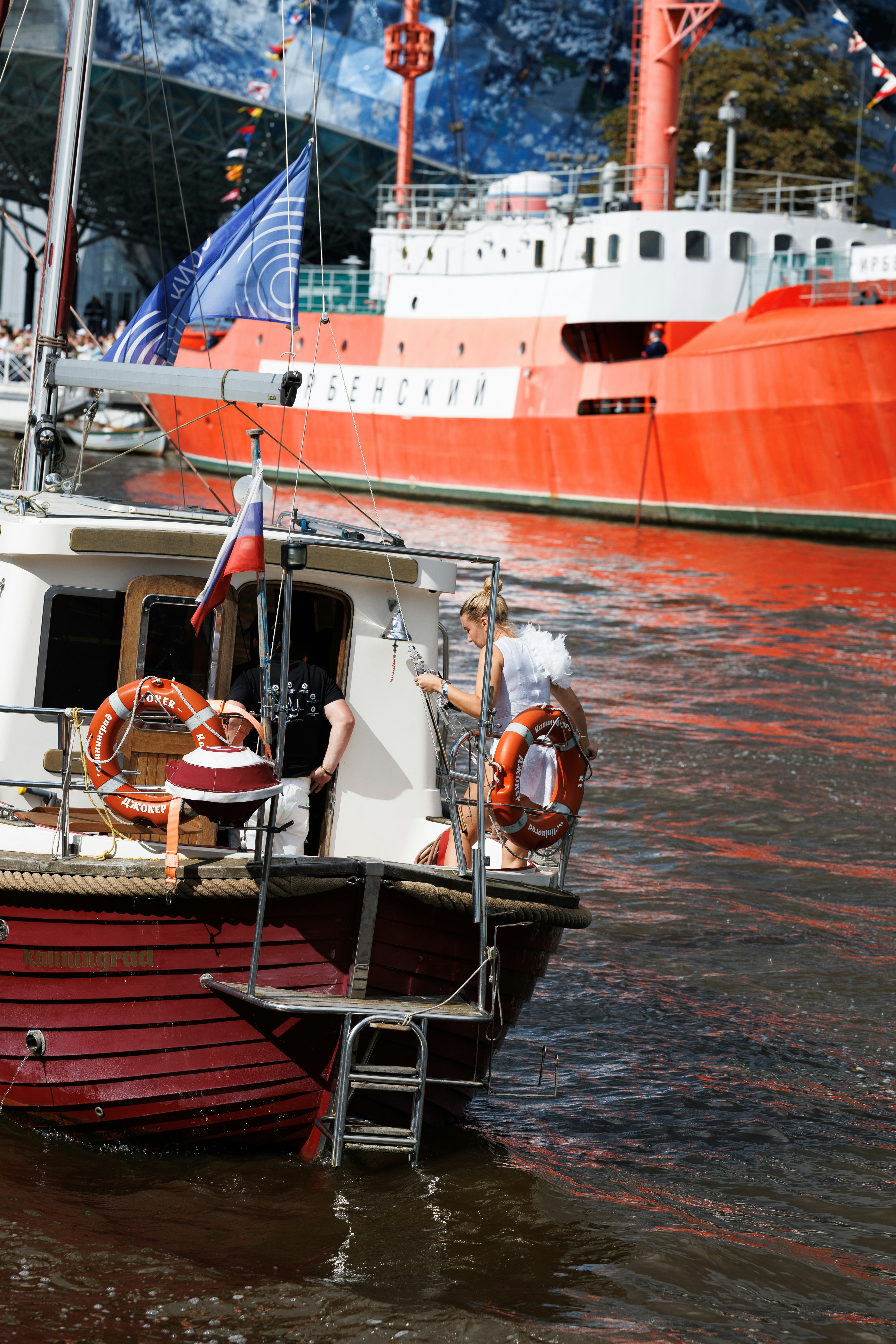 Life on the Dock: A Red-Boat Encounter by the Water