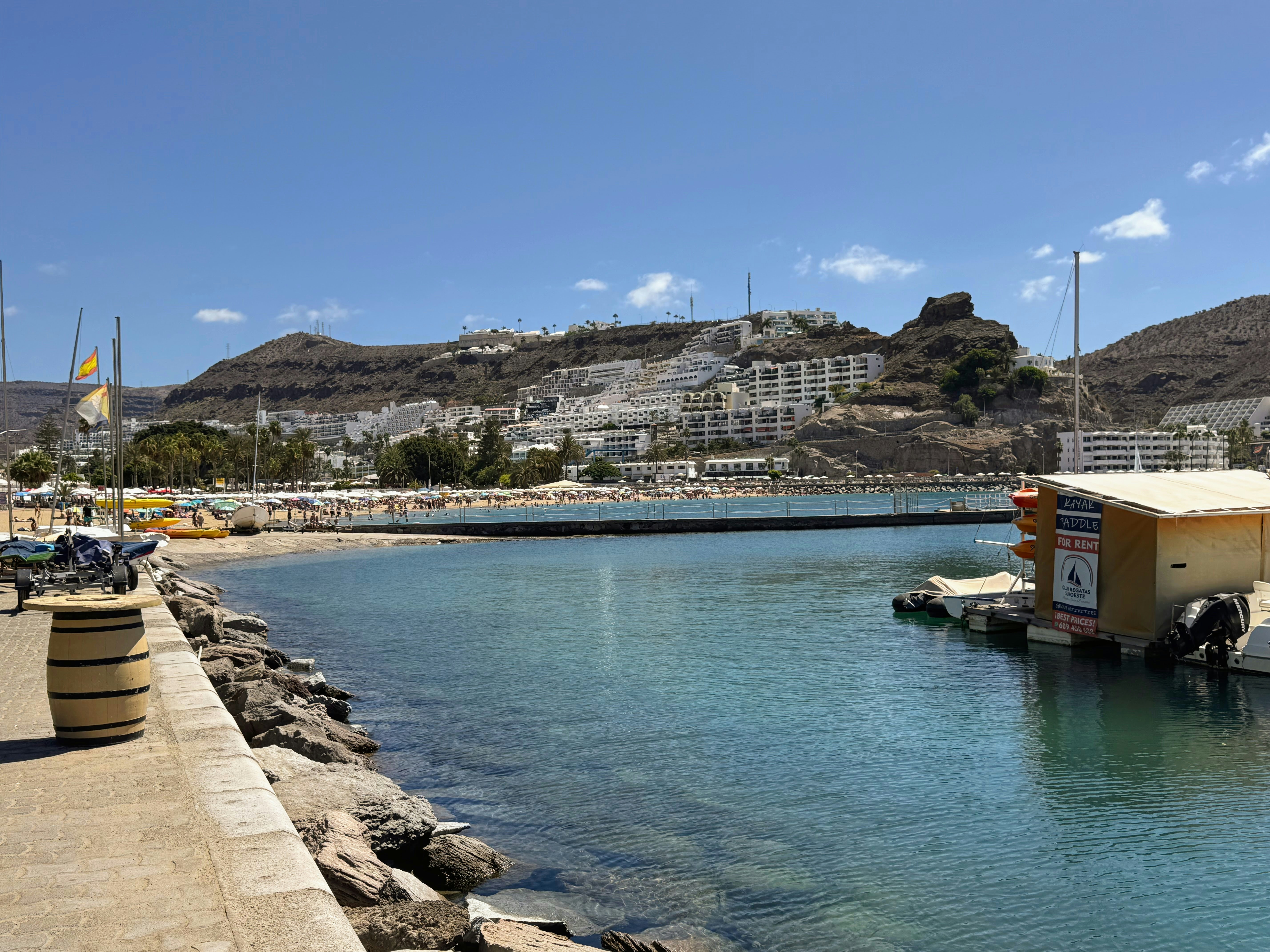Harbor Panorama: Calm Waters and Cliffside Retreat