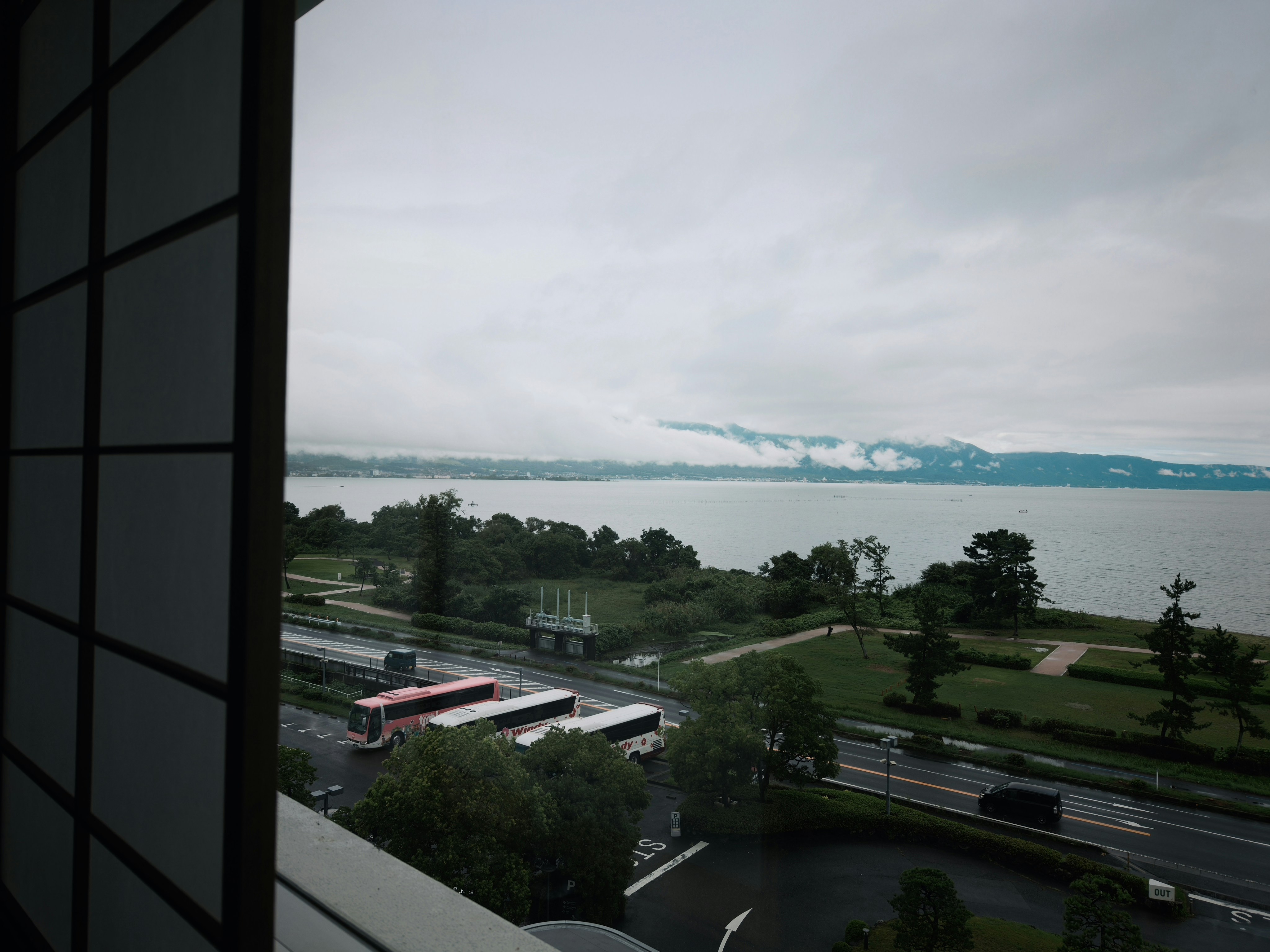 Sea, Sky, and Shoreline: A Quiet Balcony Overlooking the Lake