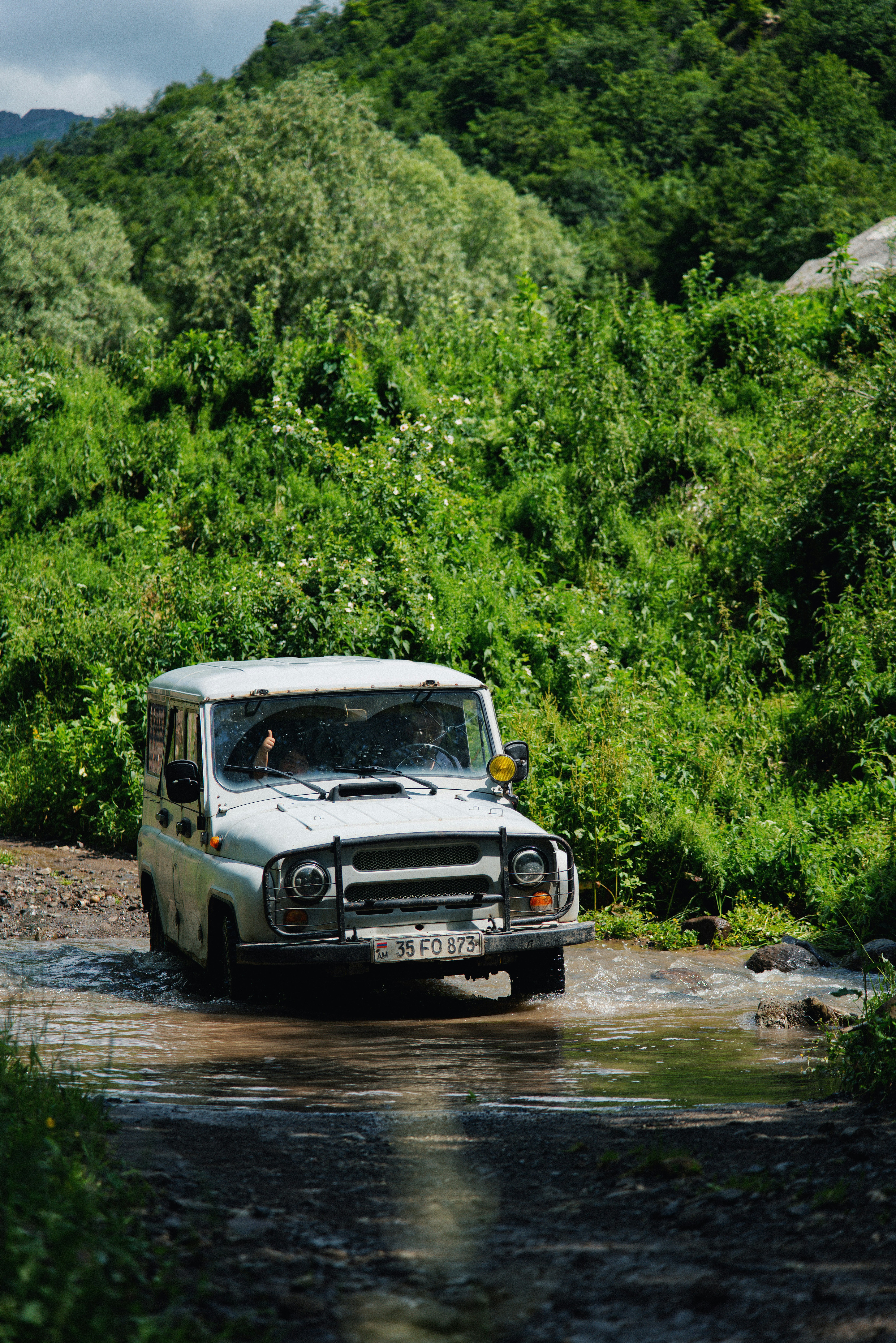 Rugged Off-Road Journey Through a Green Canyon