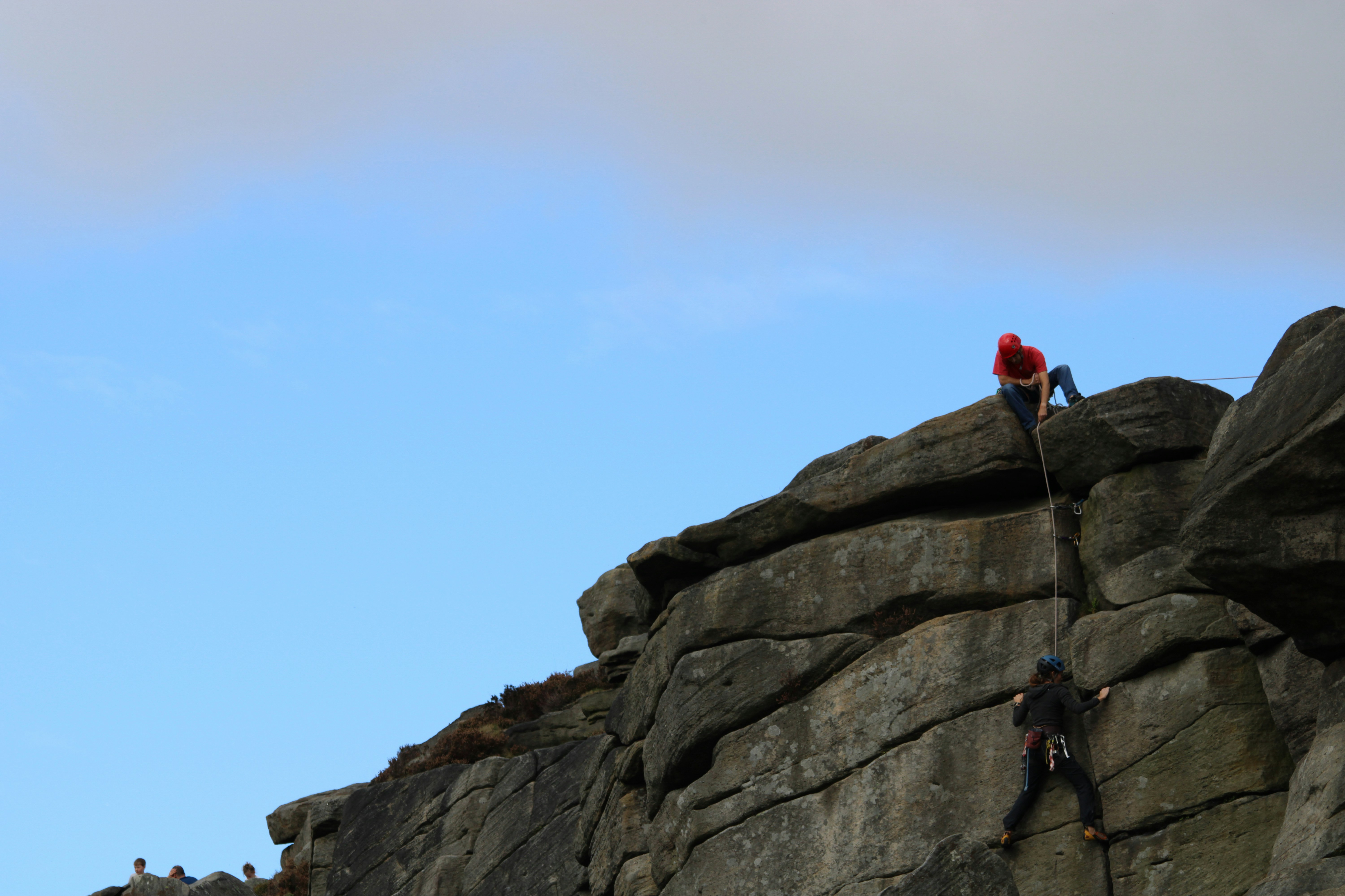 Ridge Ascent: Climbers Tugging toward the Peak