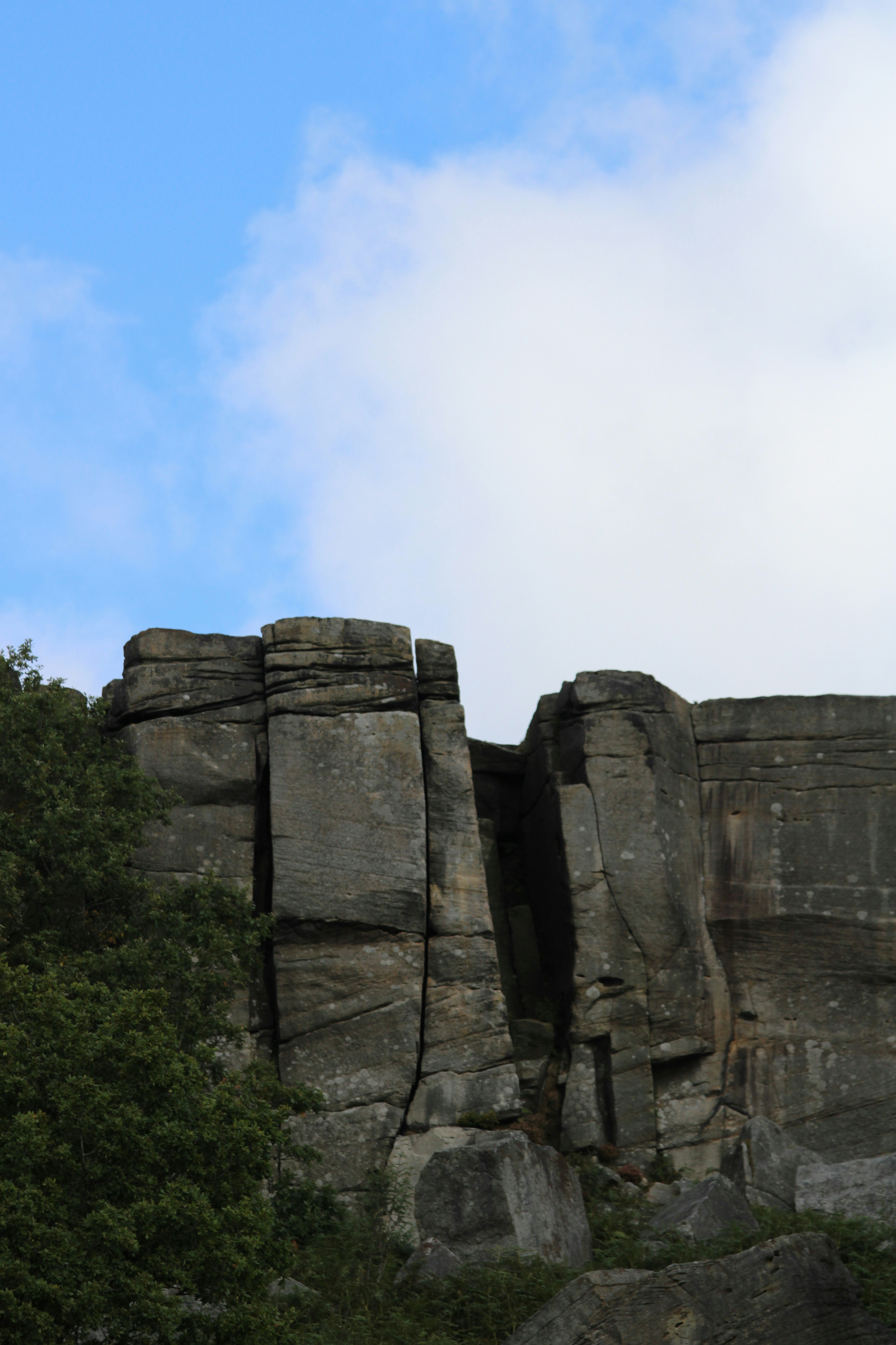Stone Giants: A Cliff Face Pierced by Time