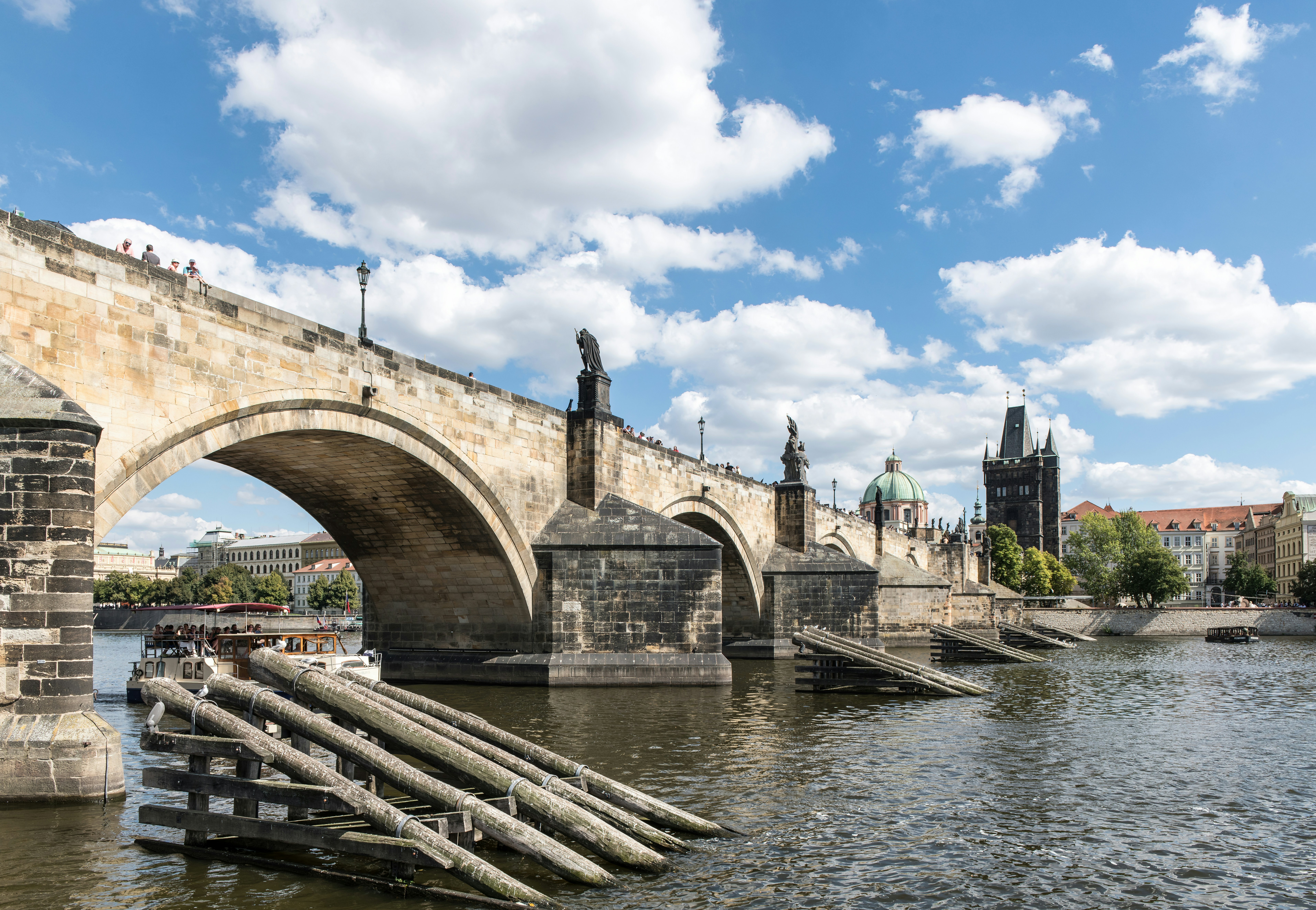Stone Arches Over the Vltava: The Old Bridge at Sundown