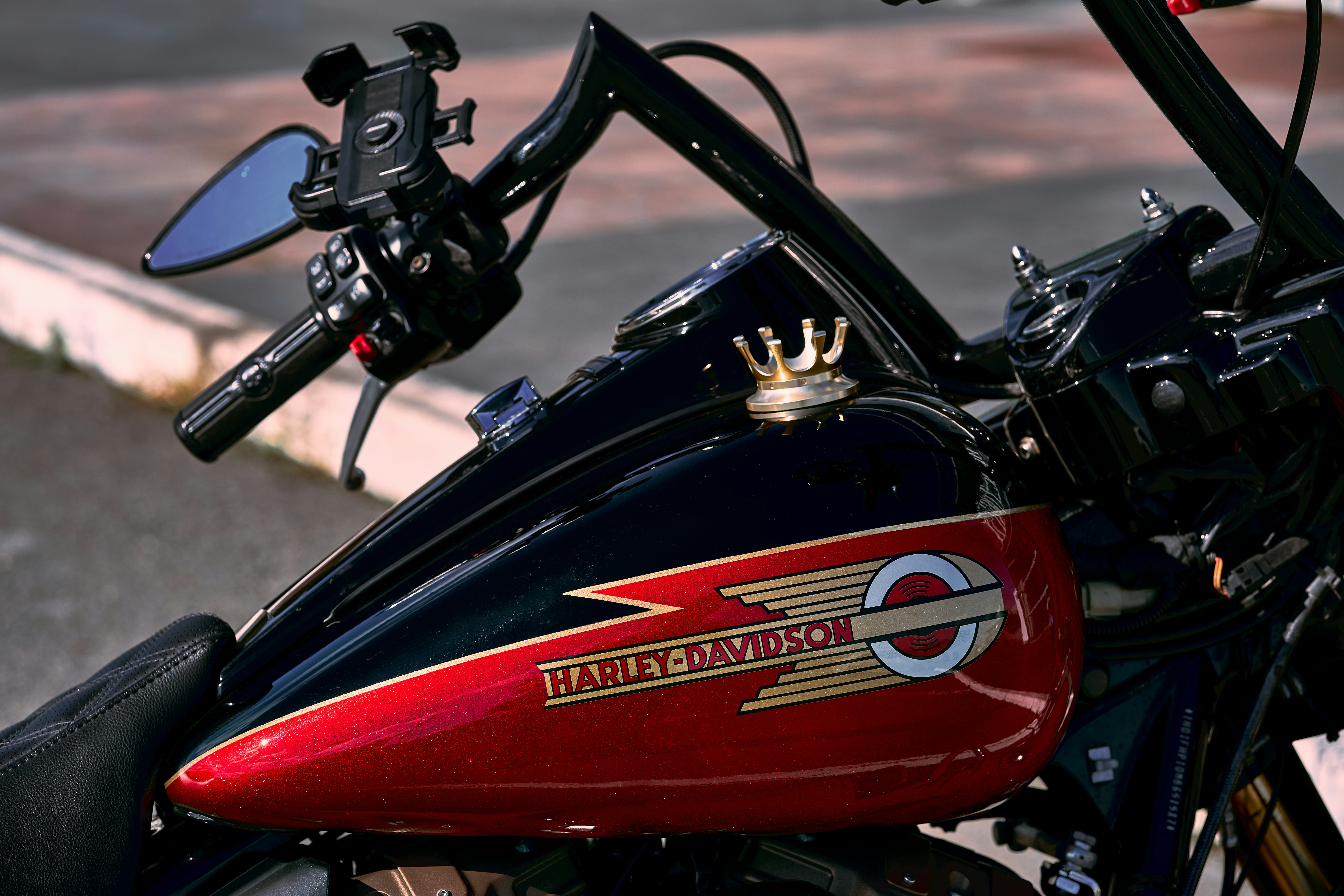 Harley in Focus: Crowned Red Tank on a Midnight Ride