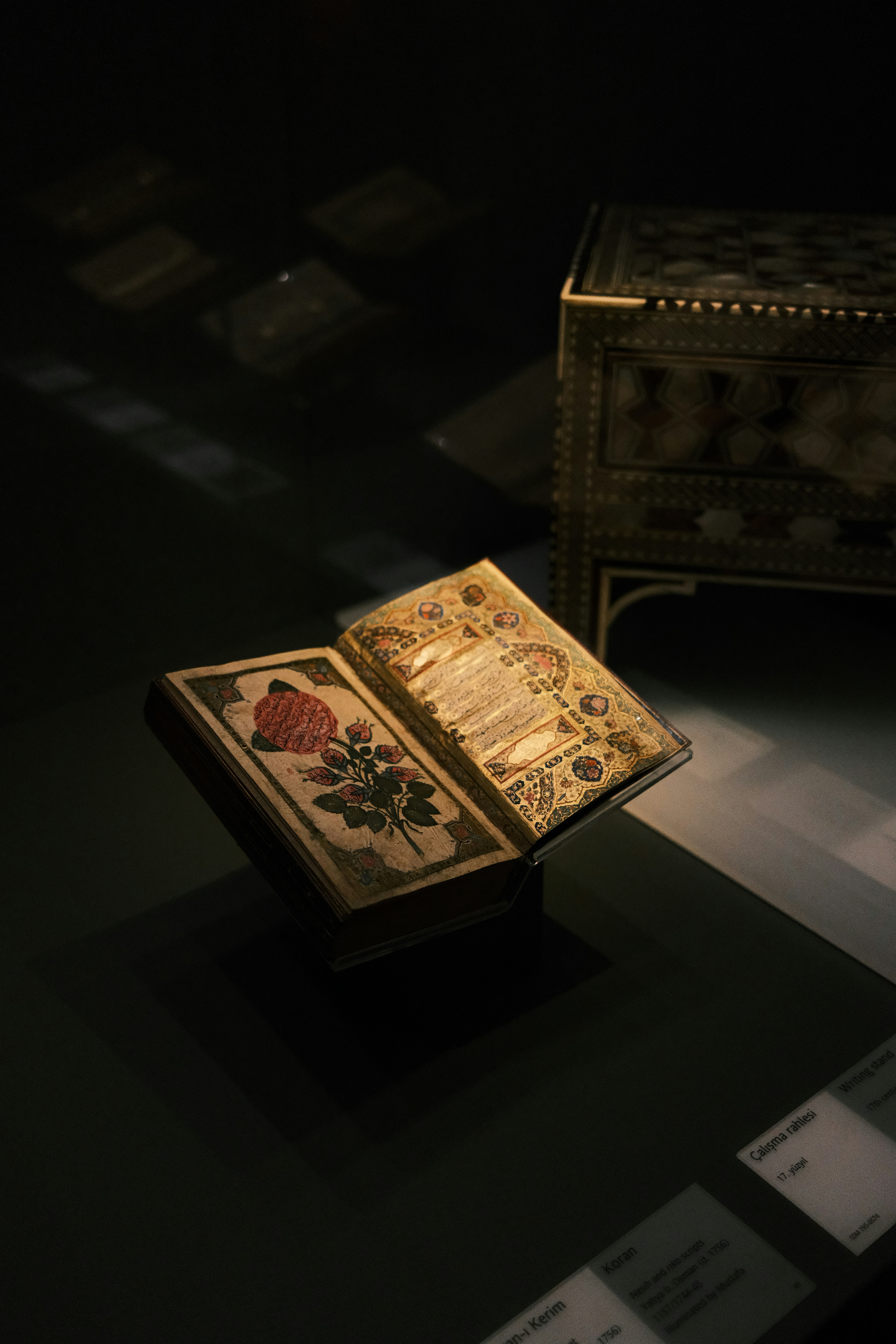 Miniaturized Majesty: An Open Ancient Manuscript on Display