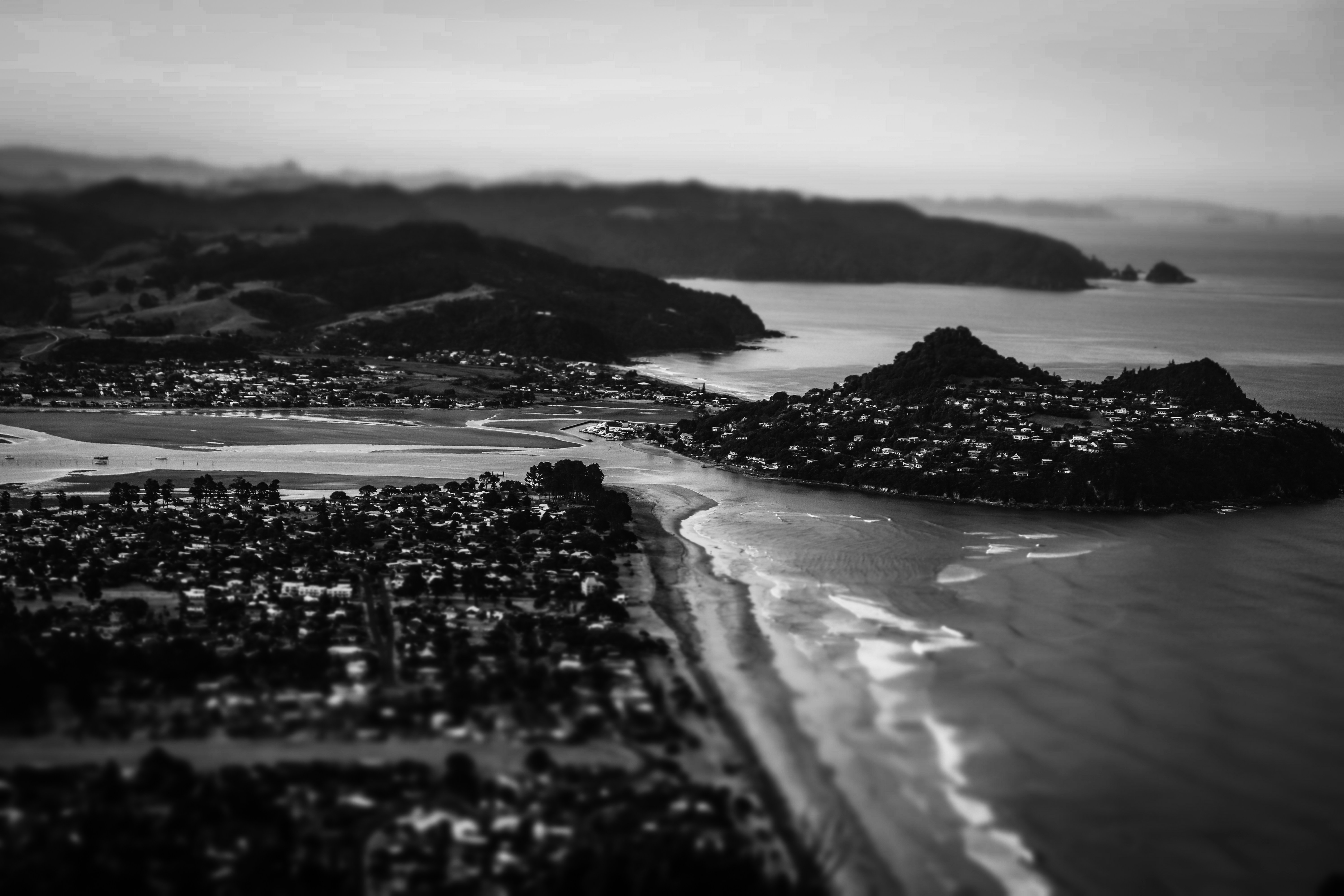 Coastal Noir: A Bayfront Villagecarved by Light and Shadow