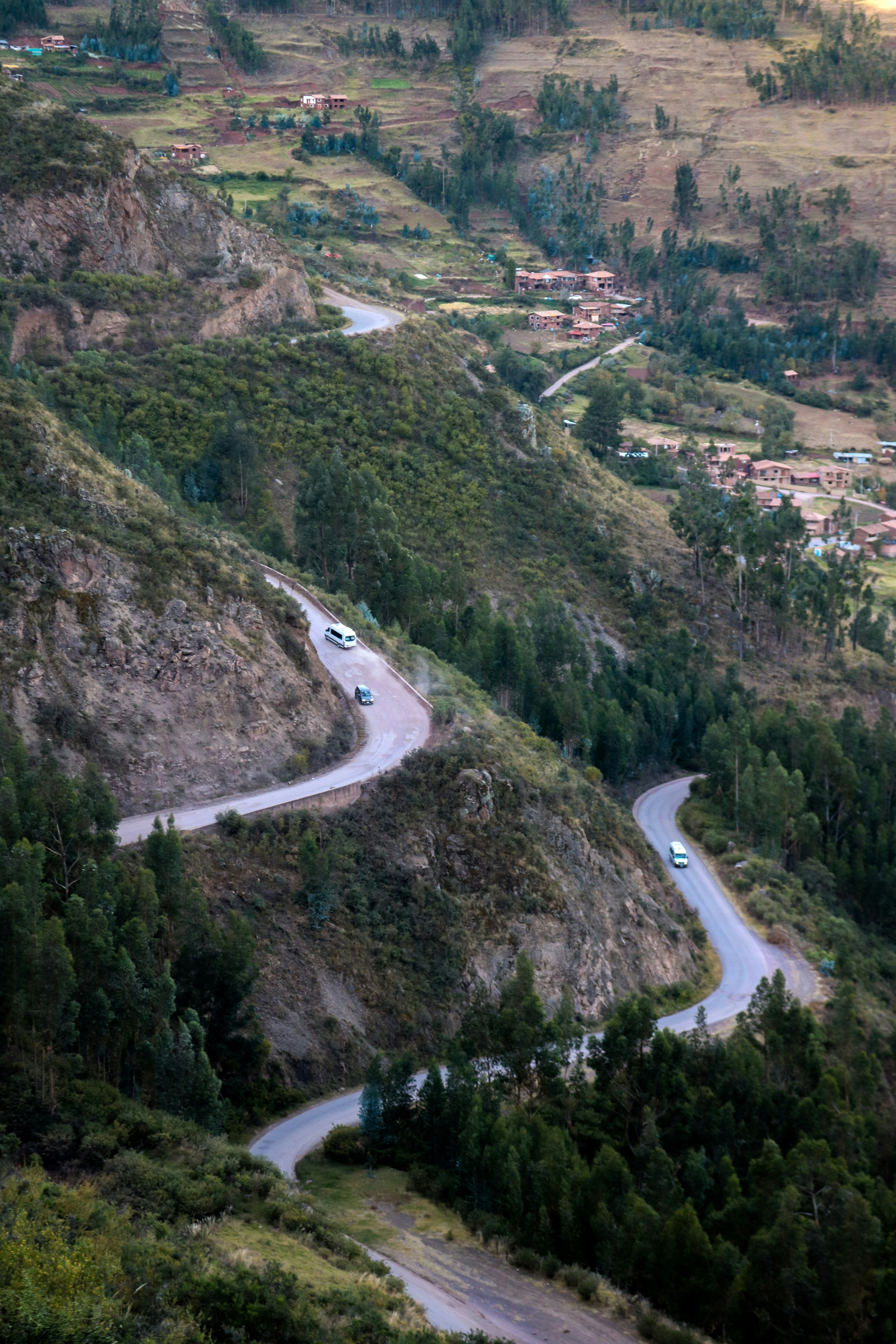 Winding Mountain Road Carve Through Terraced Valleys