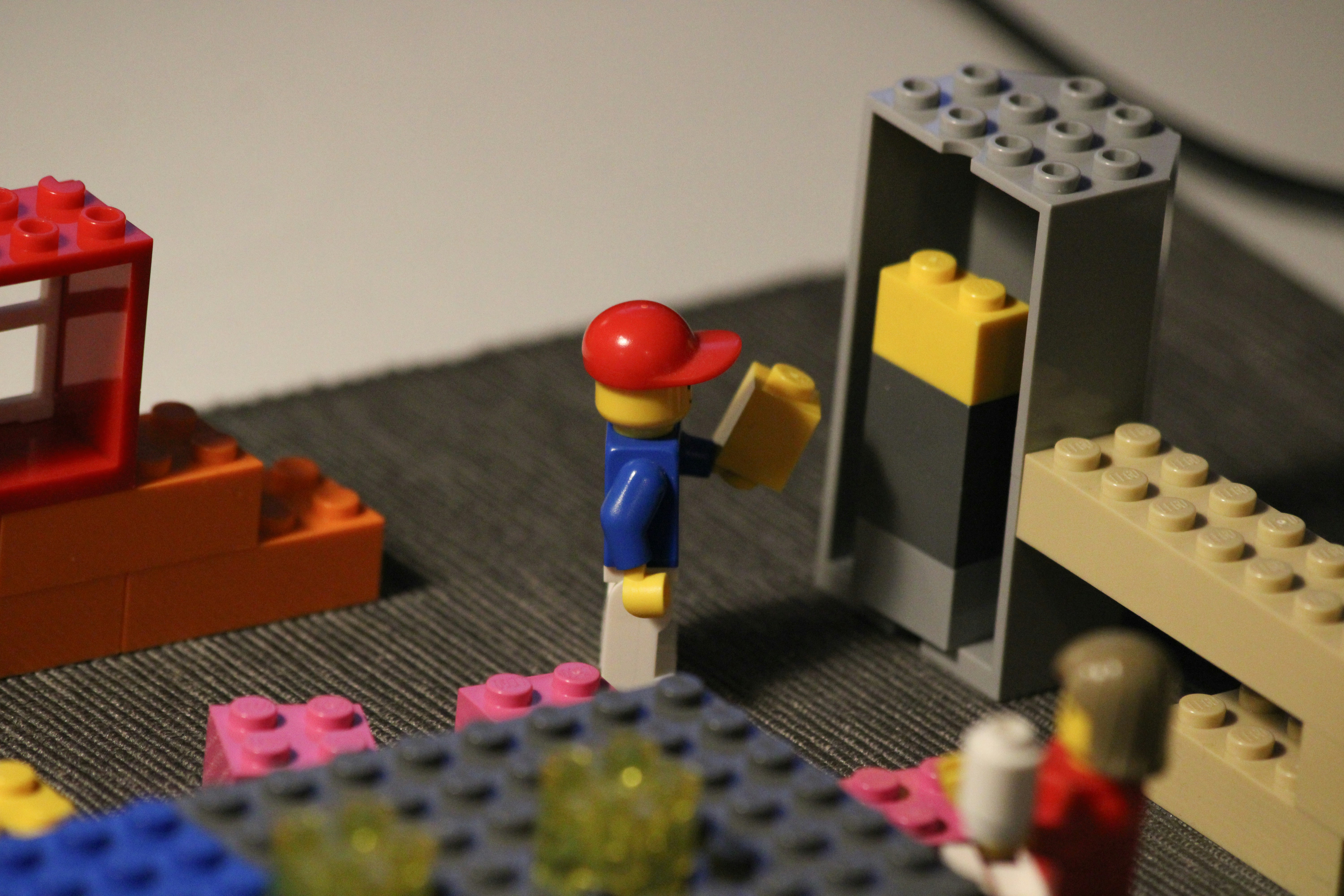 Minifigure in a Building City Scene with Brick Structures