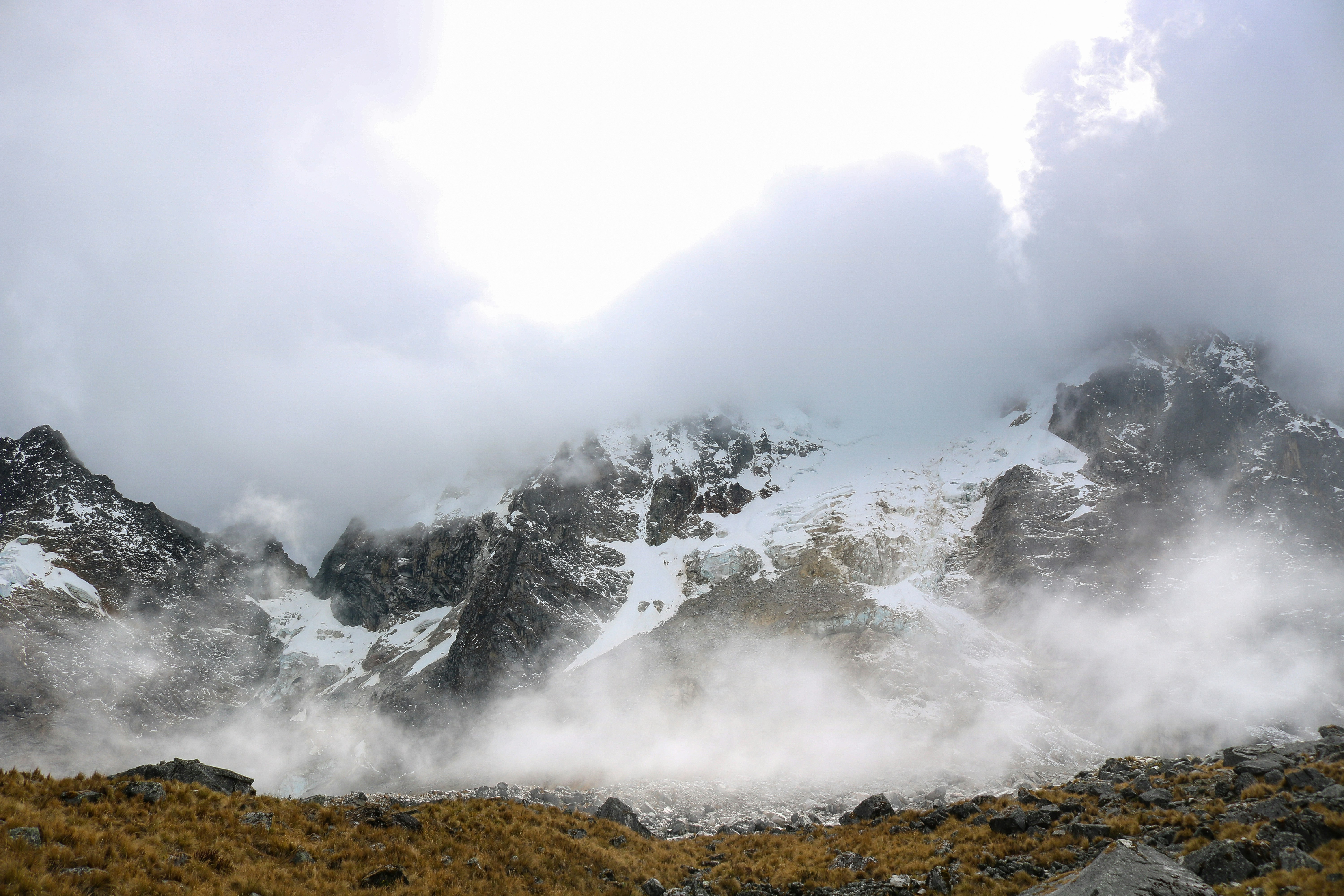 Mist-Laced Peaks Over a Rugged Moor