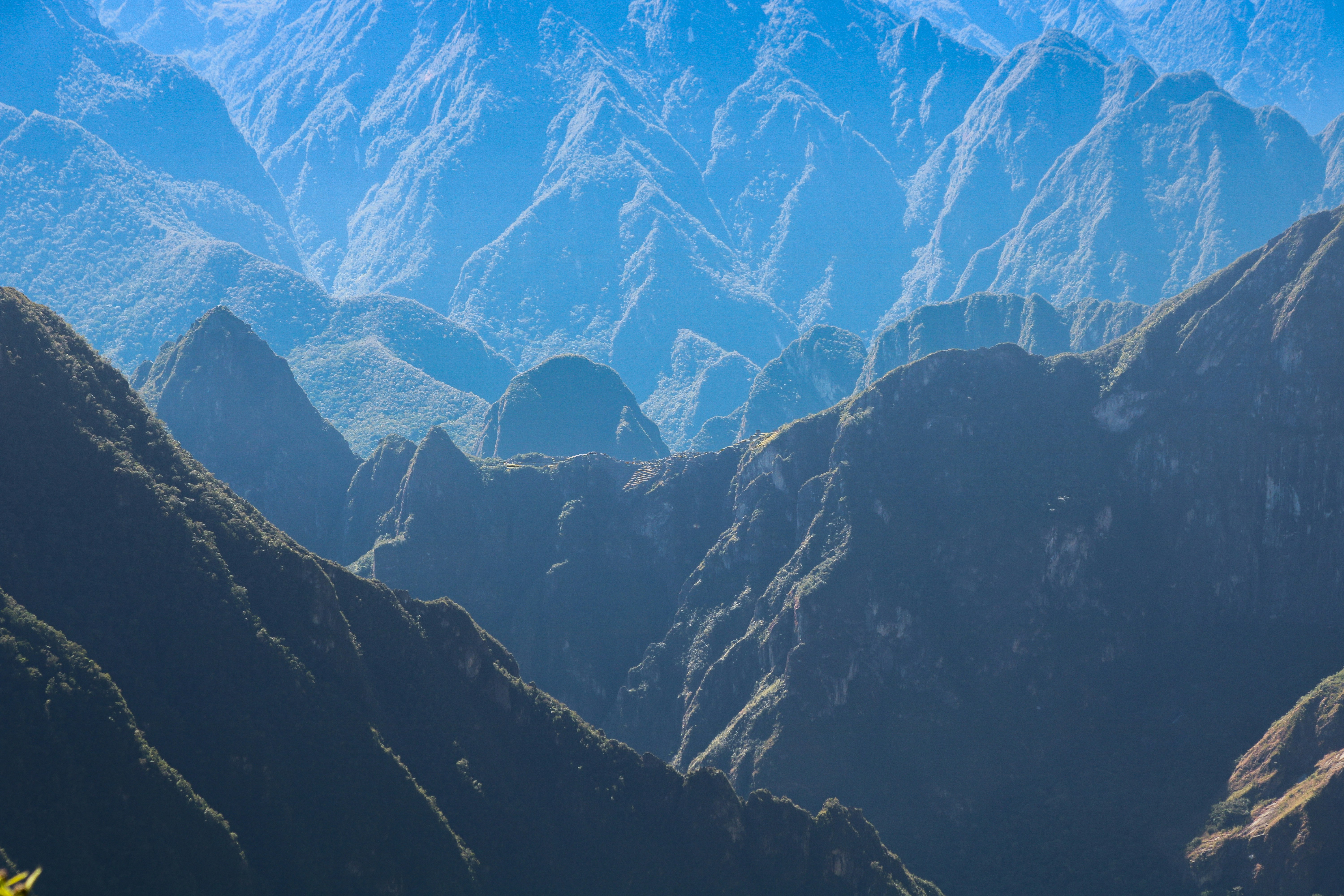 Valley of Echoed Peaks at Midday Light