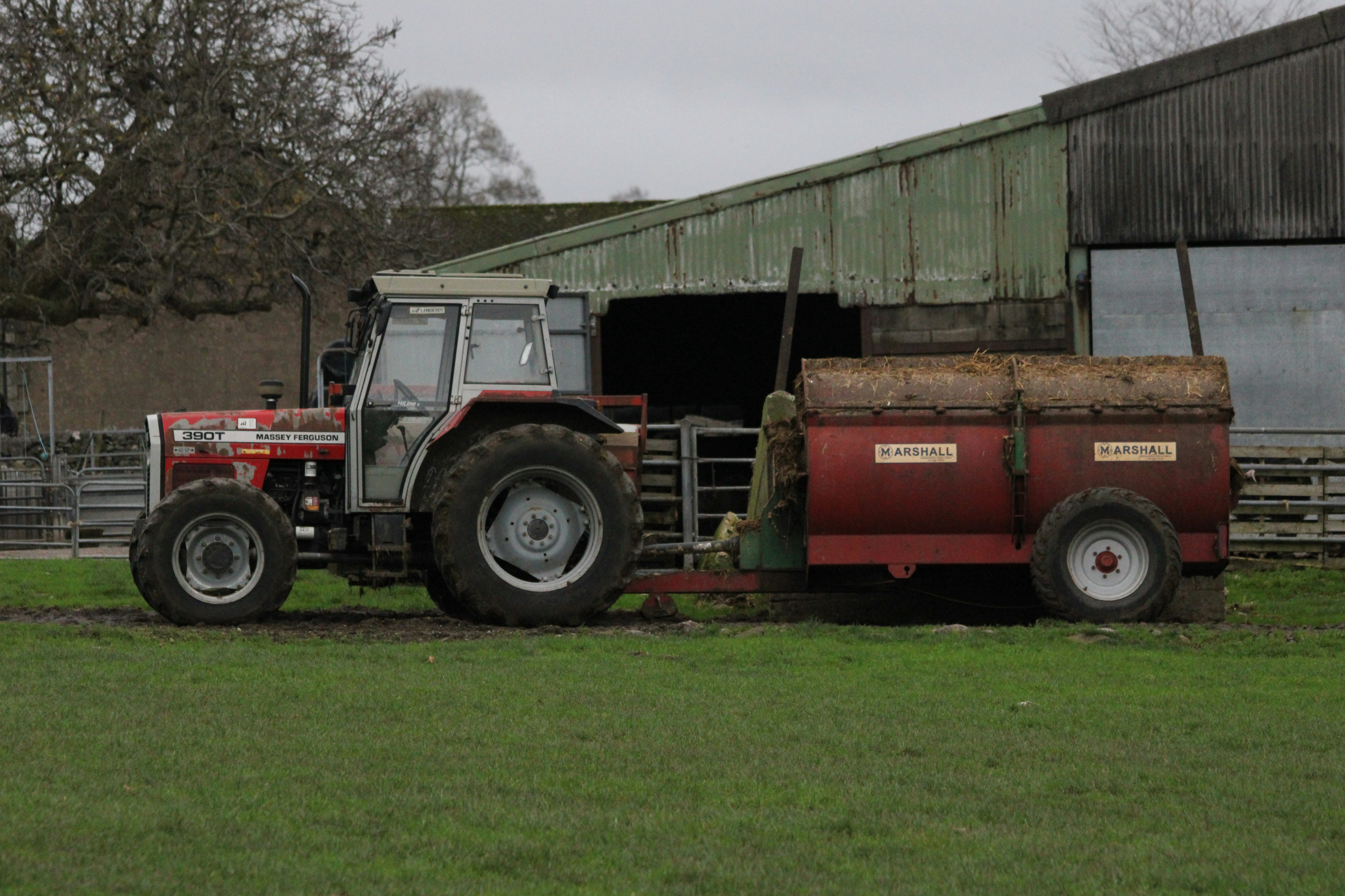 Red Tractor and Baler on a Quiet Farm