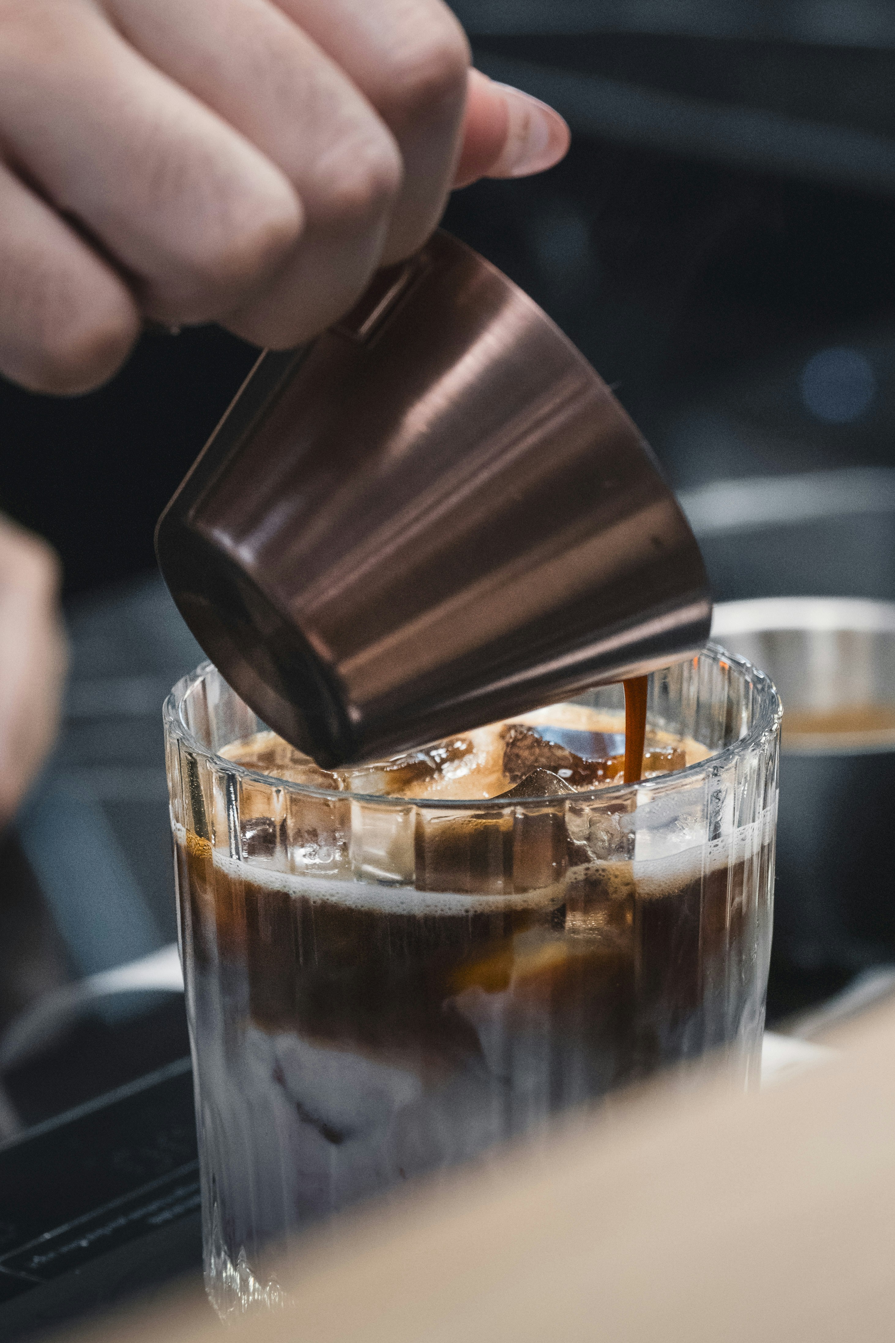 Copper Pour: Crafting Espresso from a Handheld Pitch