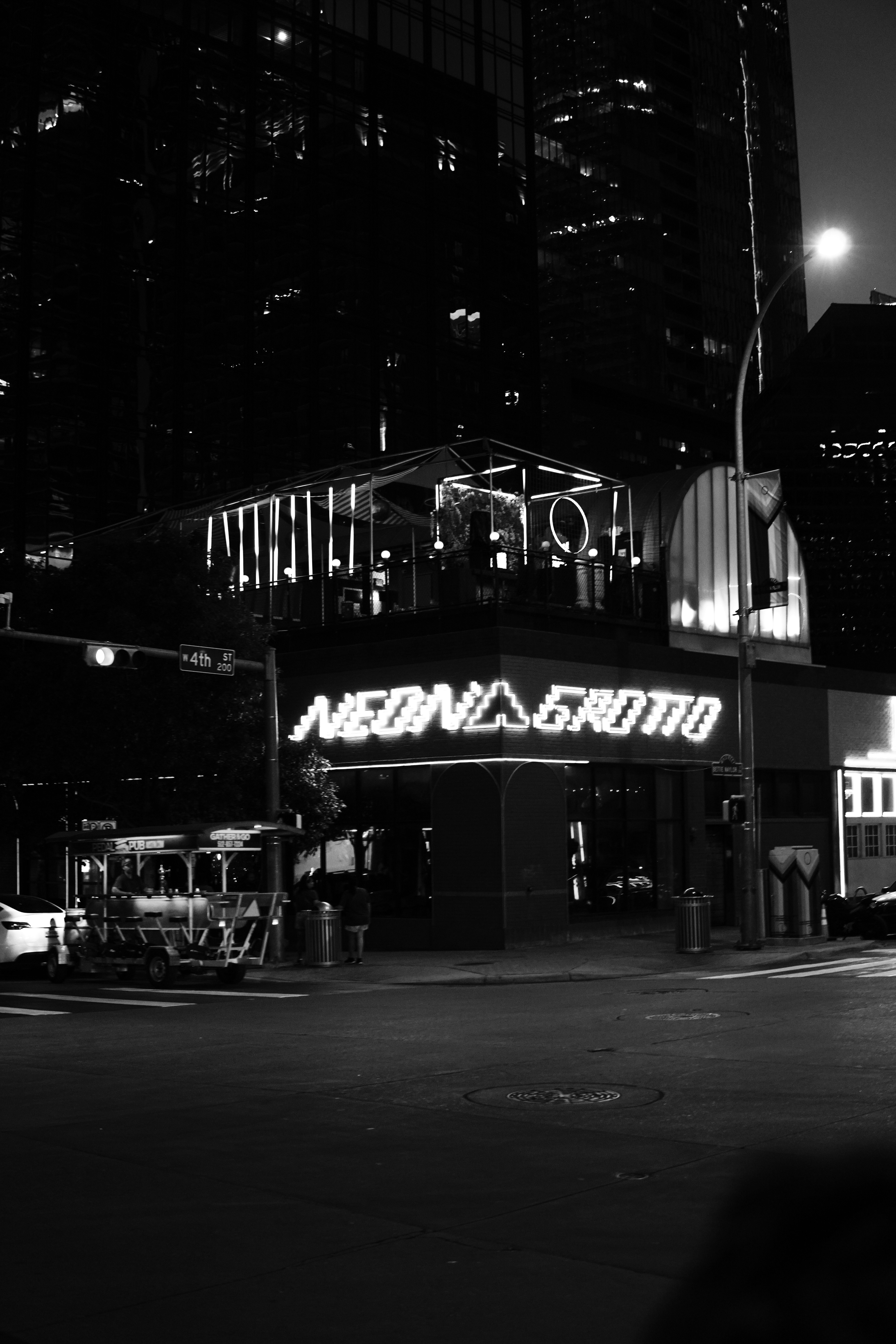 Neon Signs over Night City Entrance