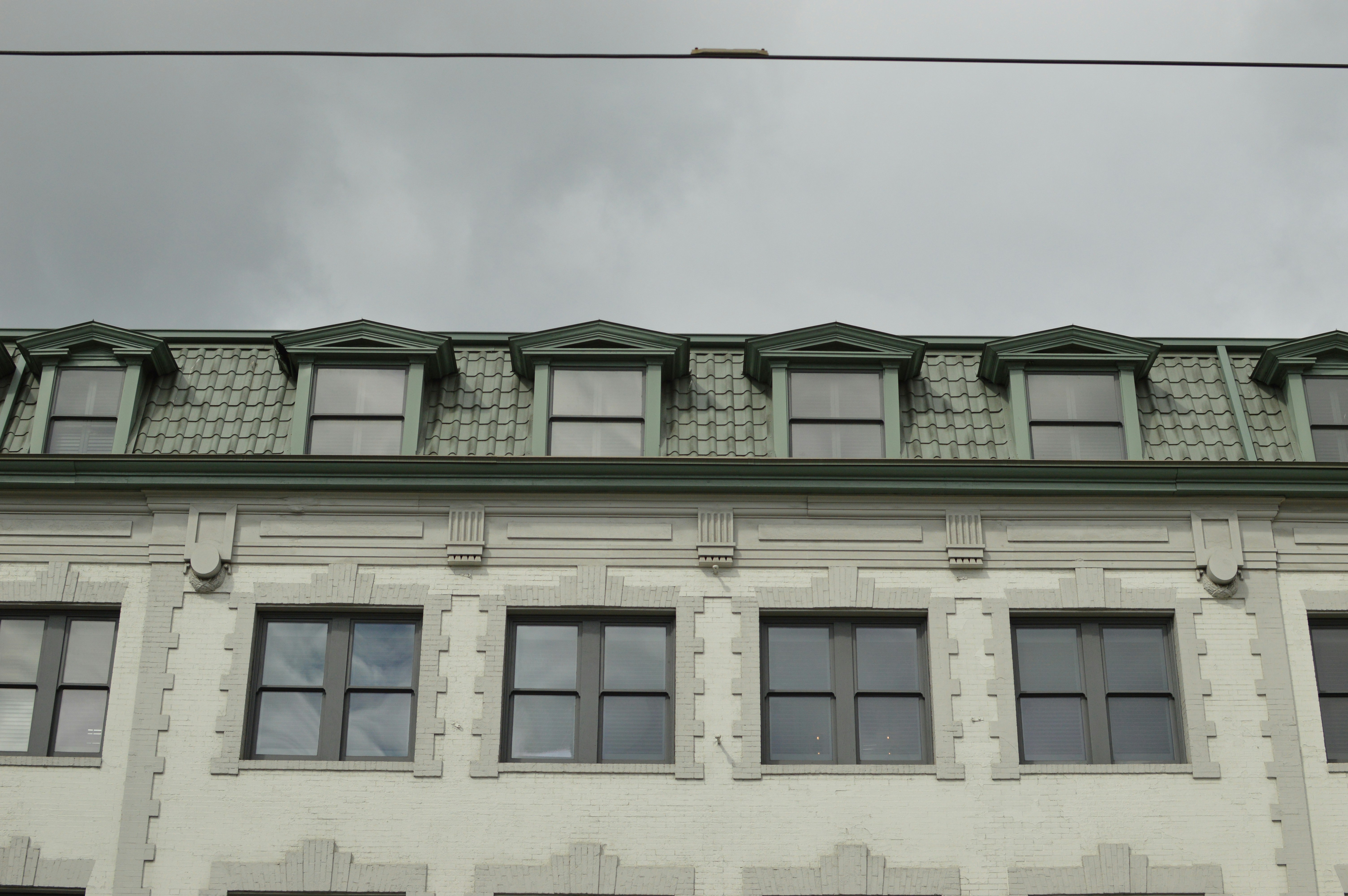 Architectural Symmetry Under a Cloudy Sky