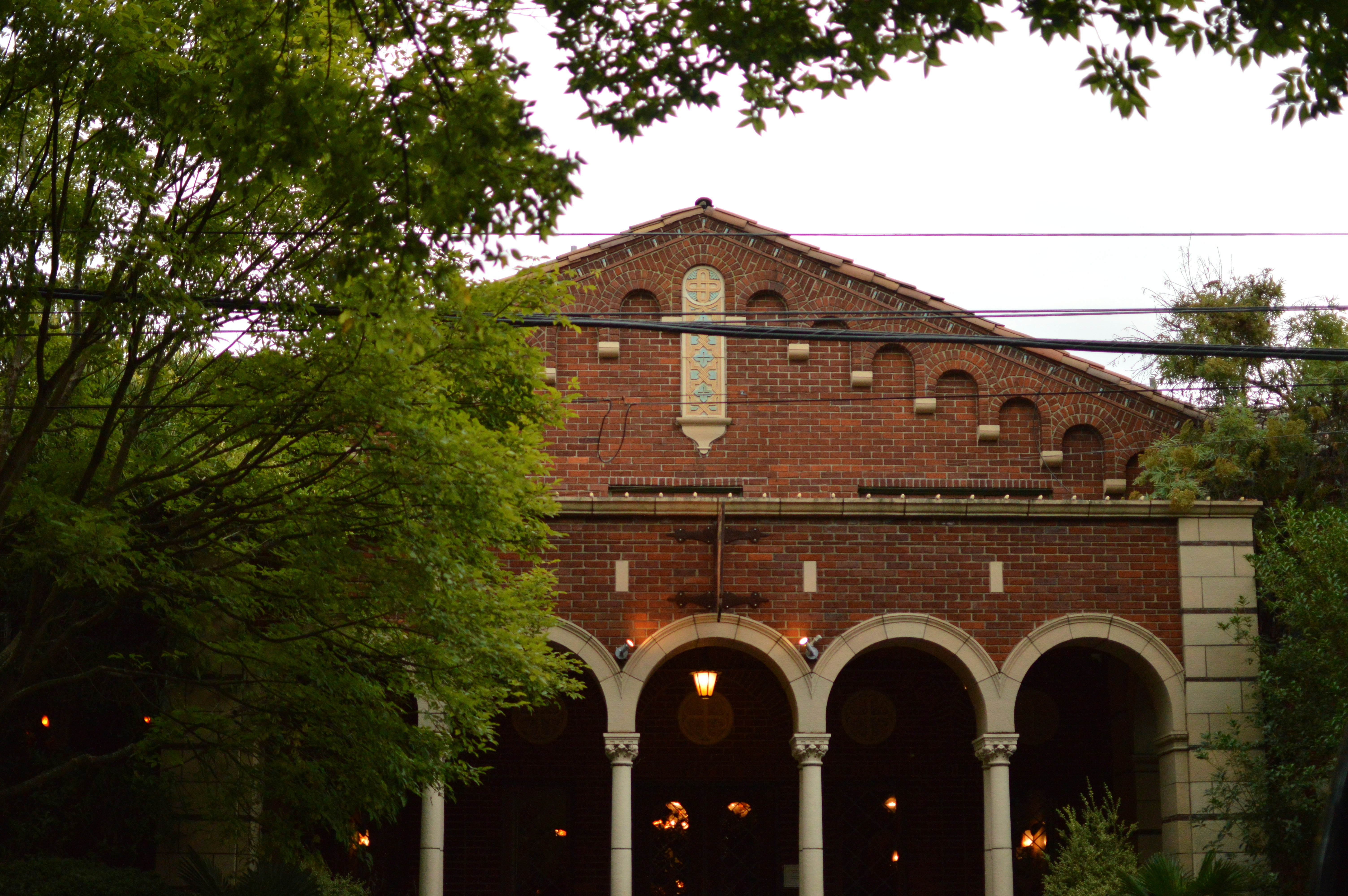 Brick Archways and Lanterns: A Quiet Campus Facade