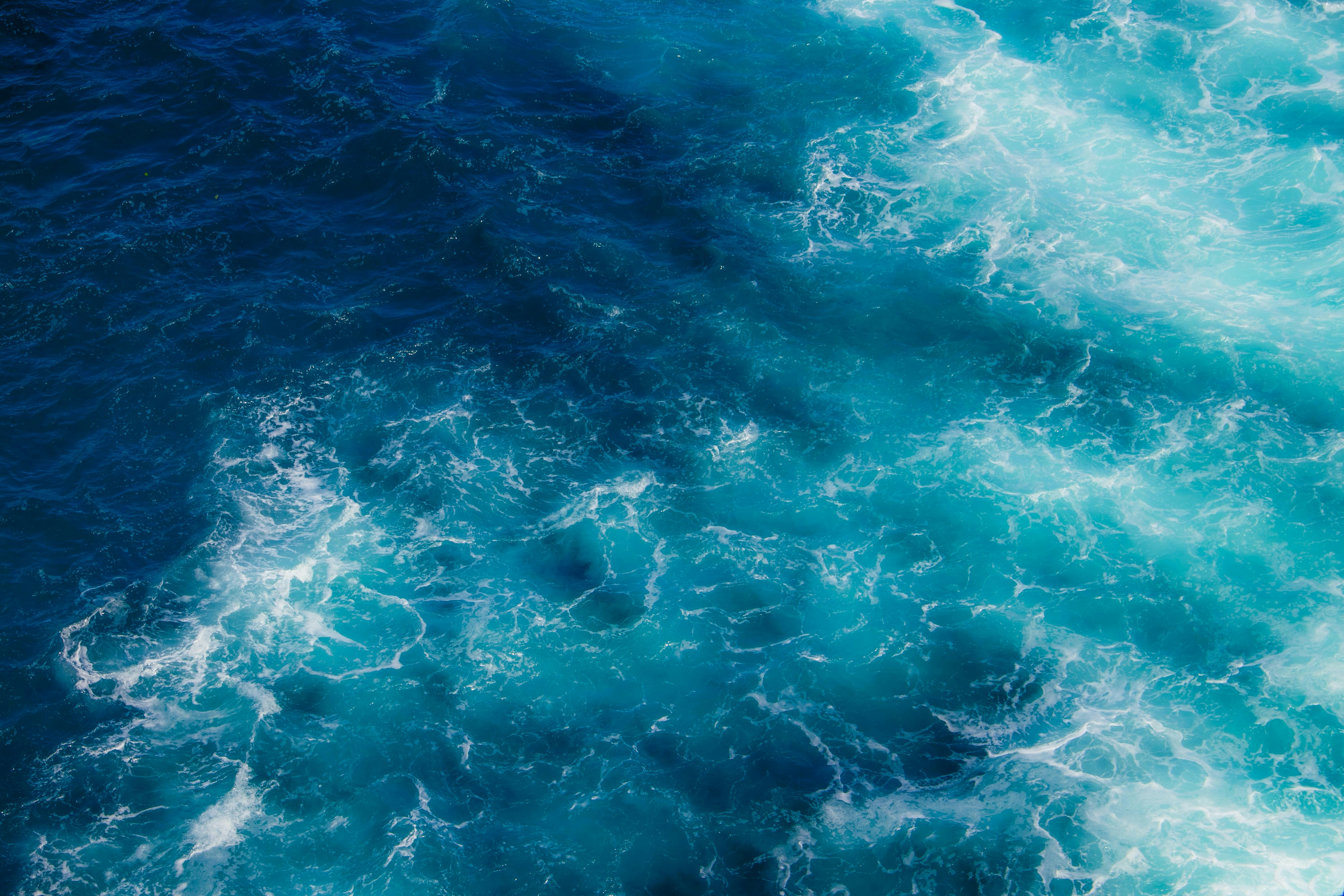 Azure Currents: Abstract Ocean Light and Shadow