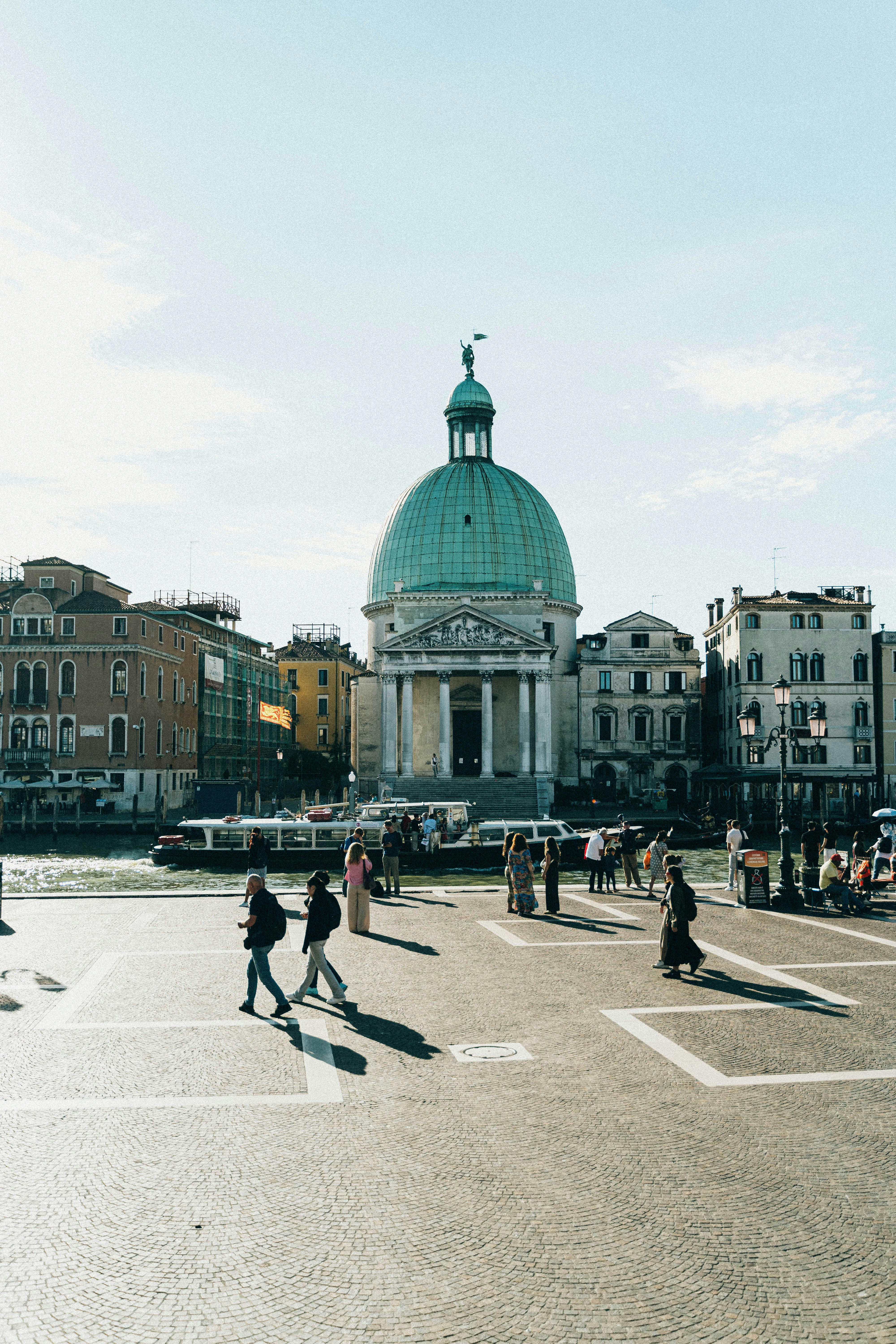 St. Mark’s Square Vigil: People Crossing Beneath a Cerulean Dome