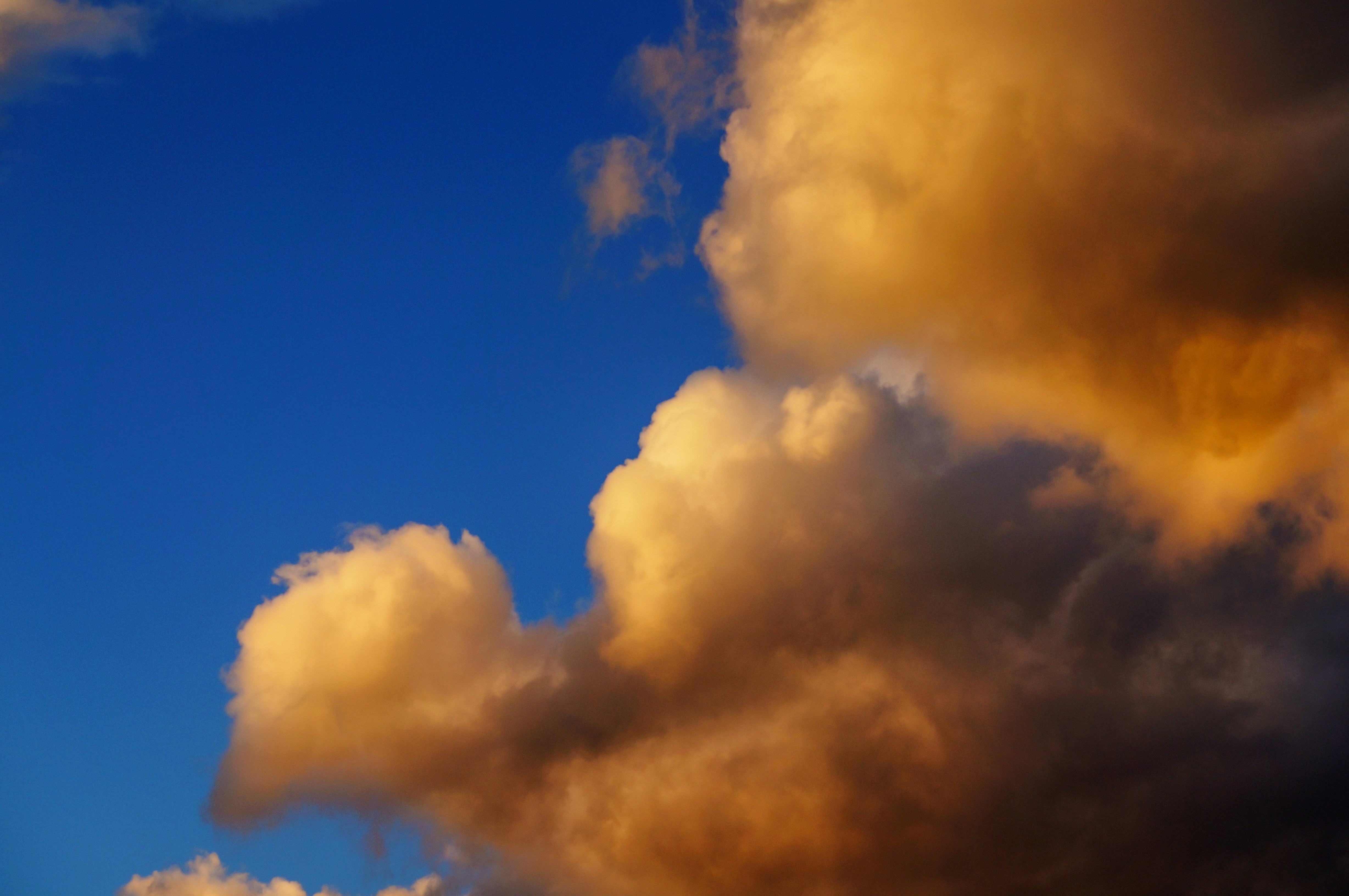 Golden Cloud Crest against a Cerulean Sky
