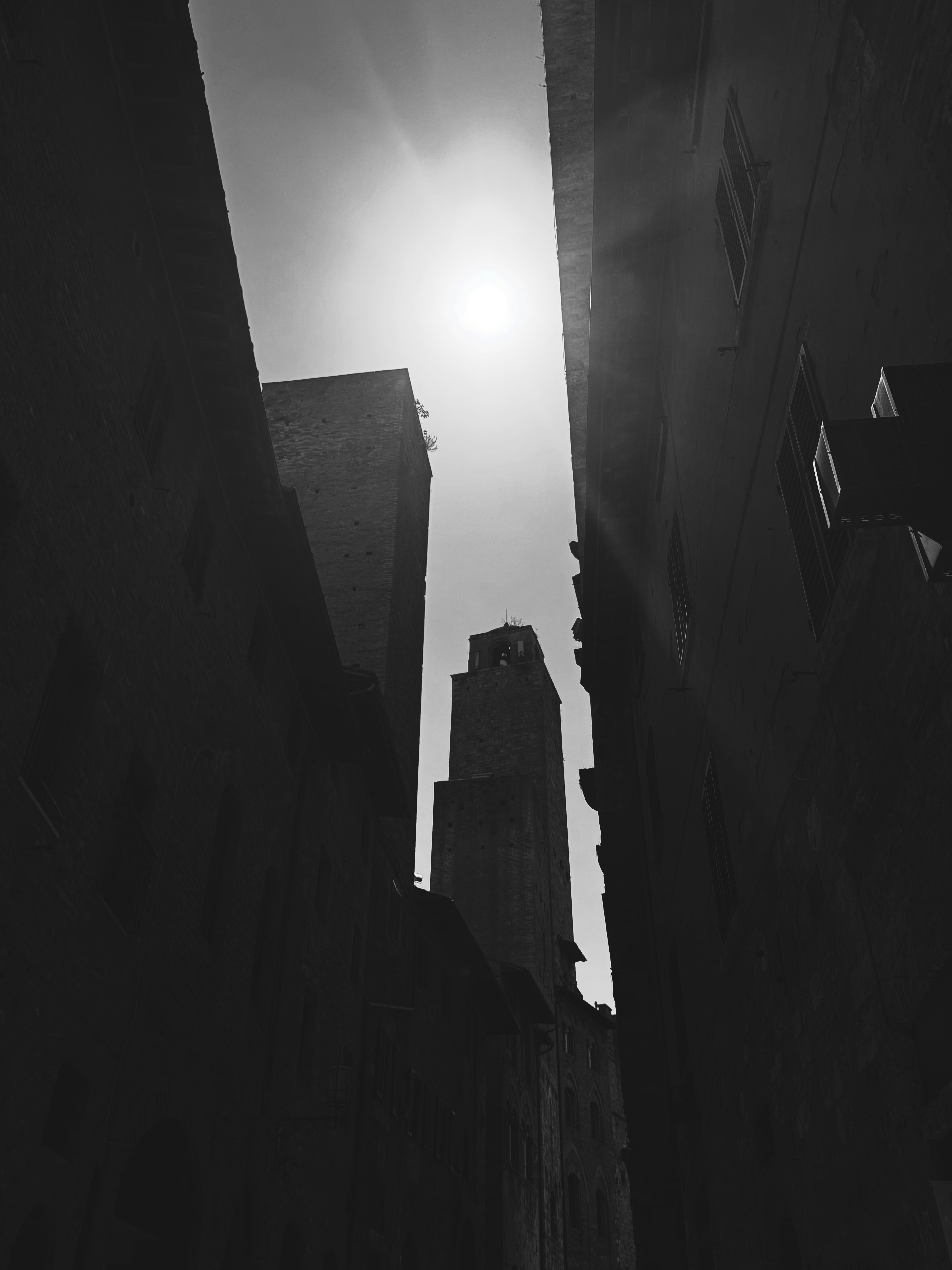 Skyward Gap: A Narrow Alley Reaches for the Sun