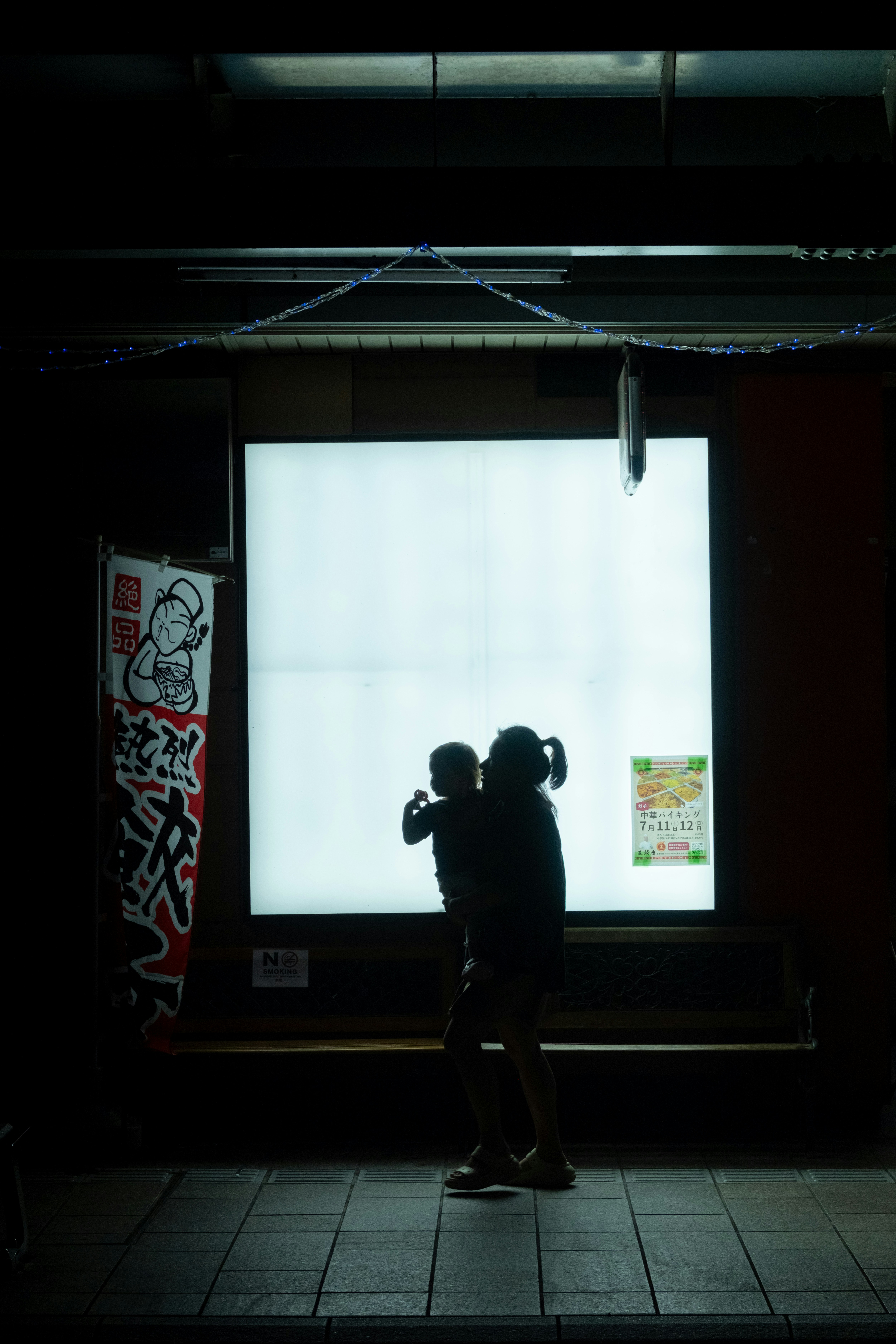 Silhouettes in Front of a Soft-Backlit Window