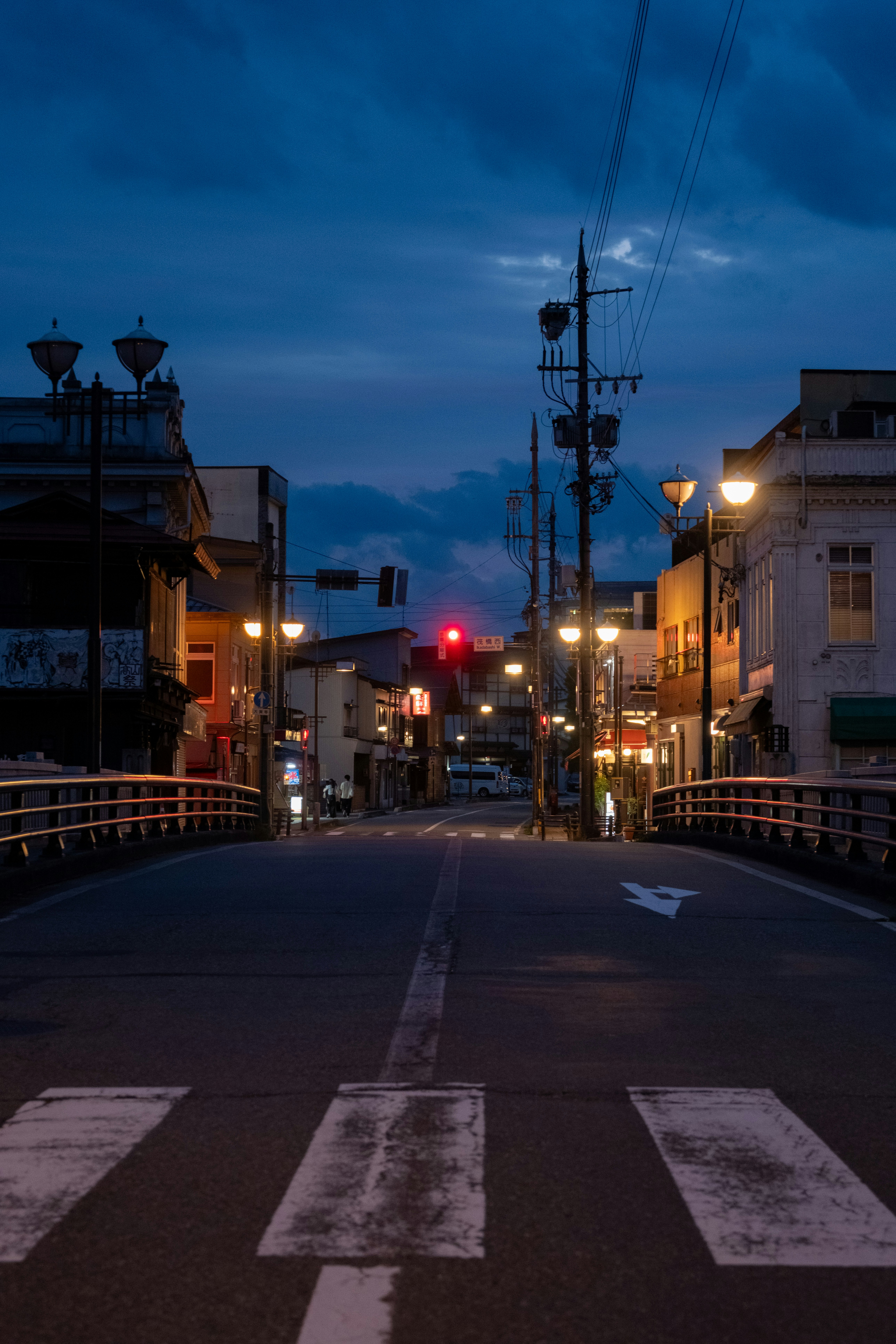 Evening Neon Through a Quiet City Street