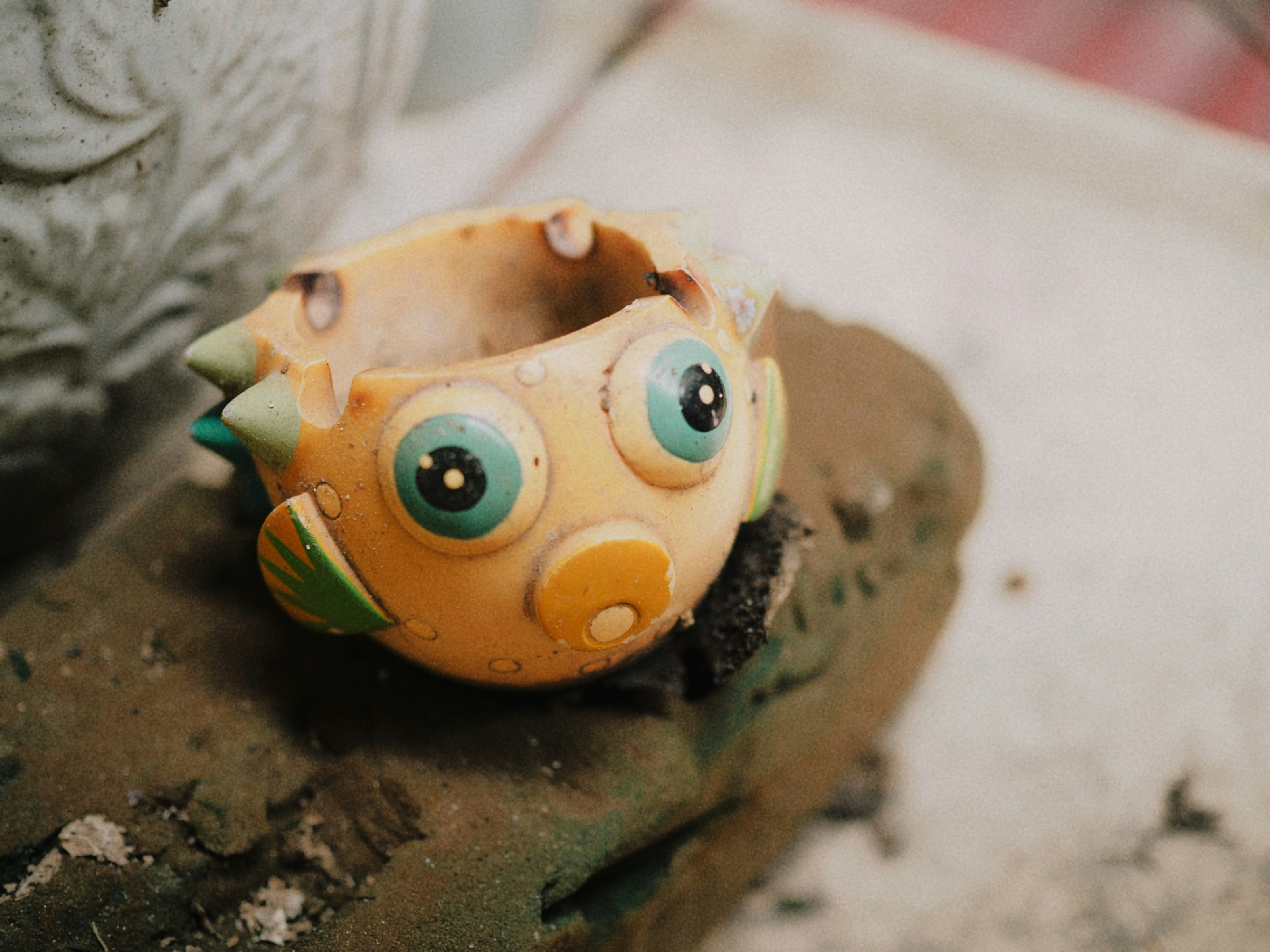 Mud-Attached Toy Orca: A Budding Ceramic Creature Reclaimed by Earth and Water