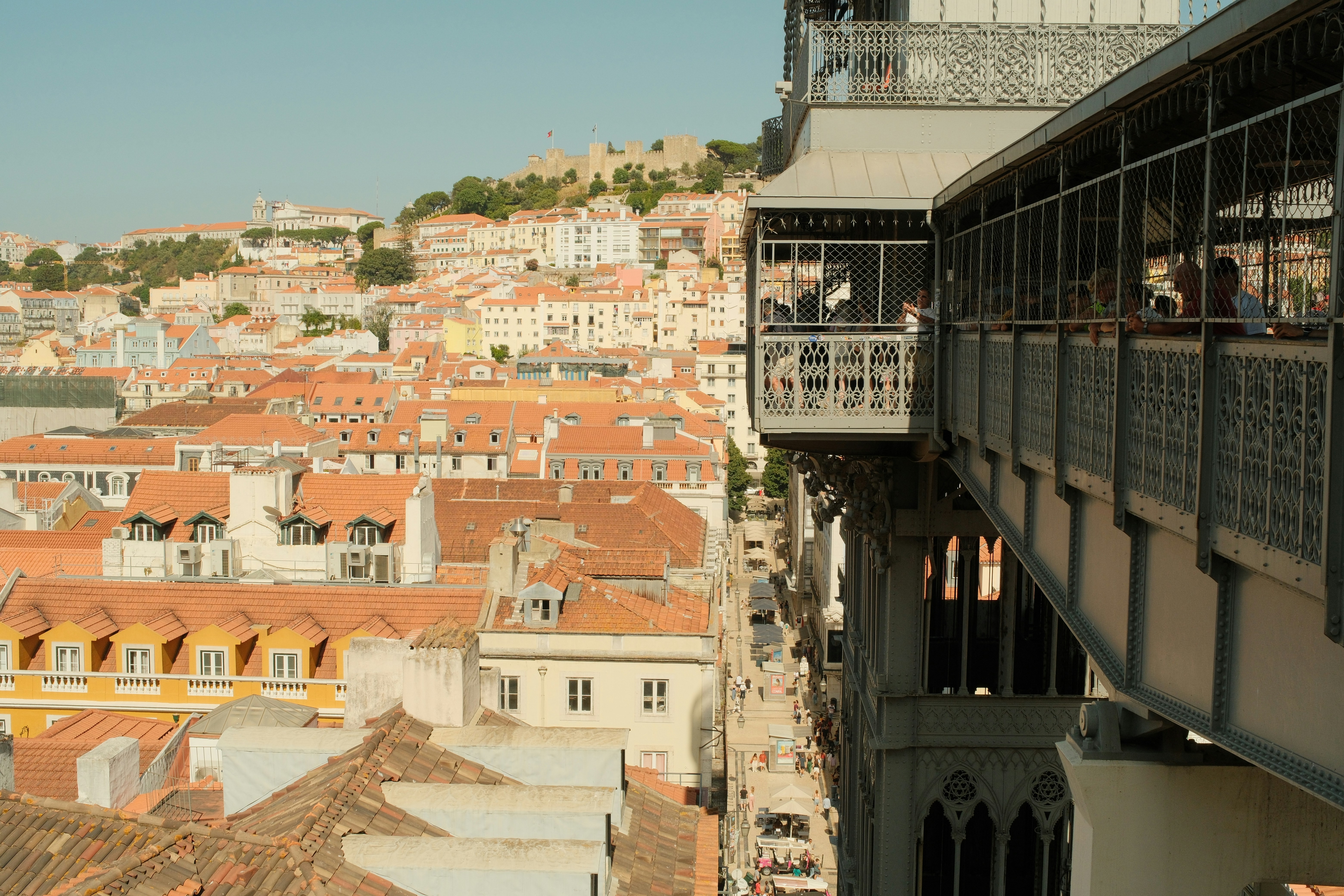 Terracotta Tides: A Balcony Over Lisbon's Red Rooftops
