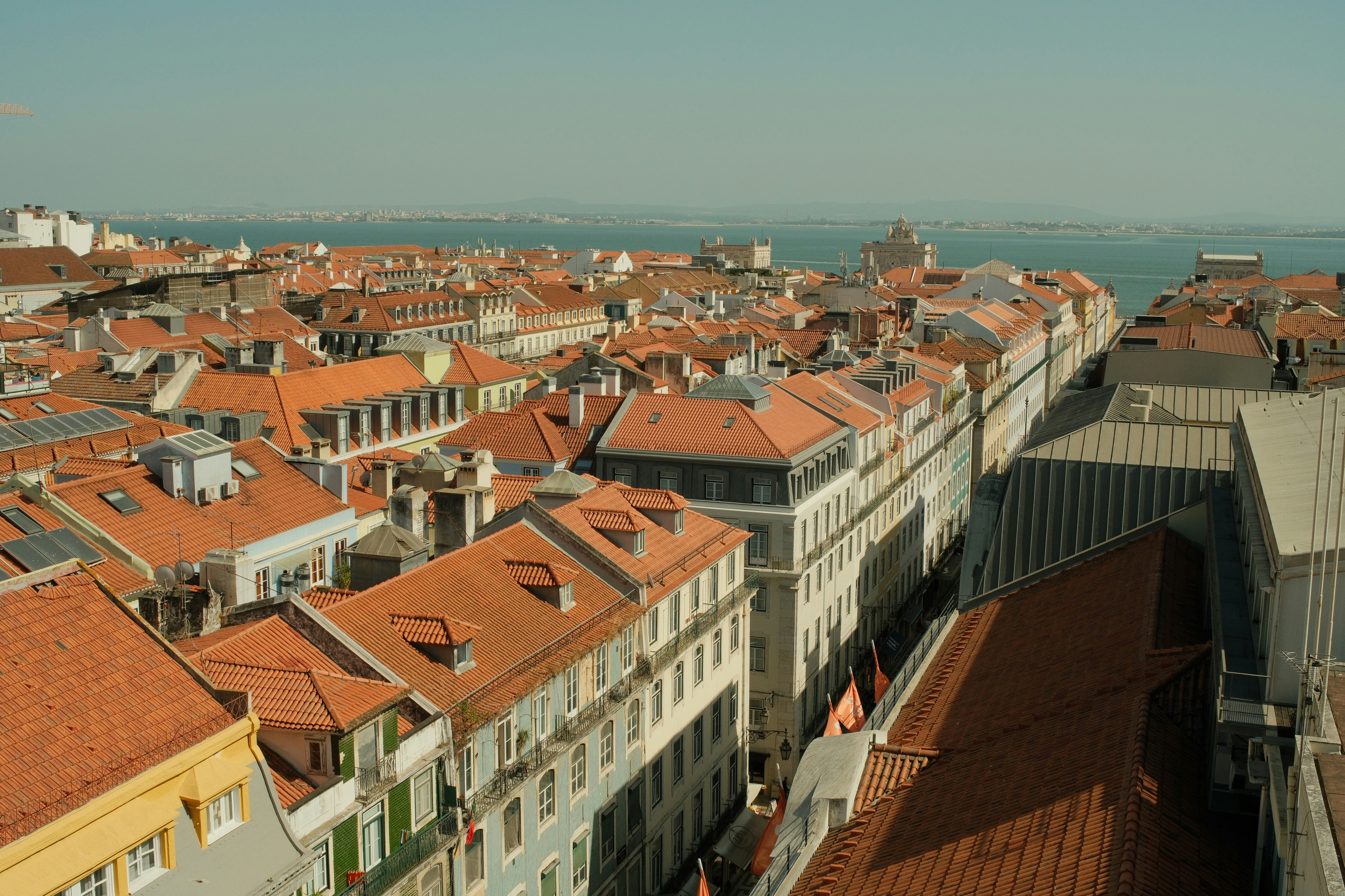 Terracotta Rooftops Stretching Toward the Seaward Horizon