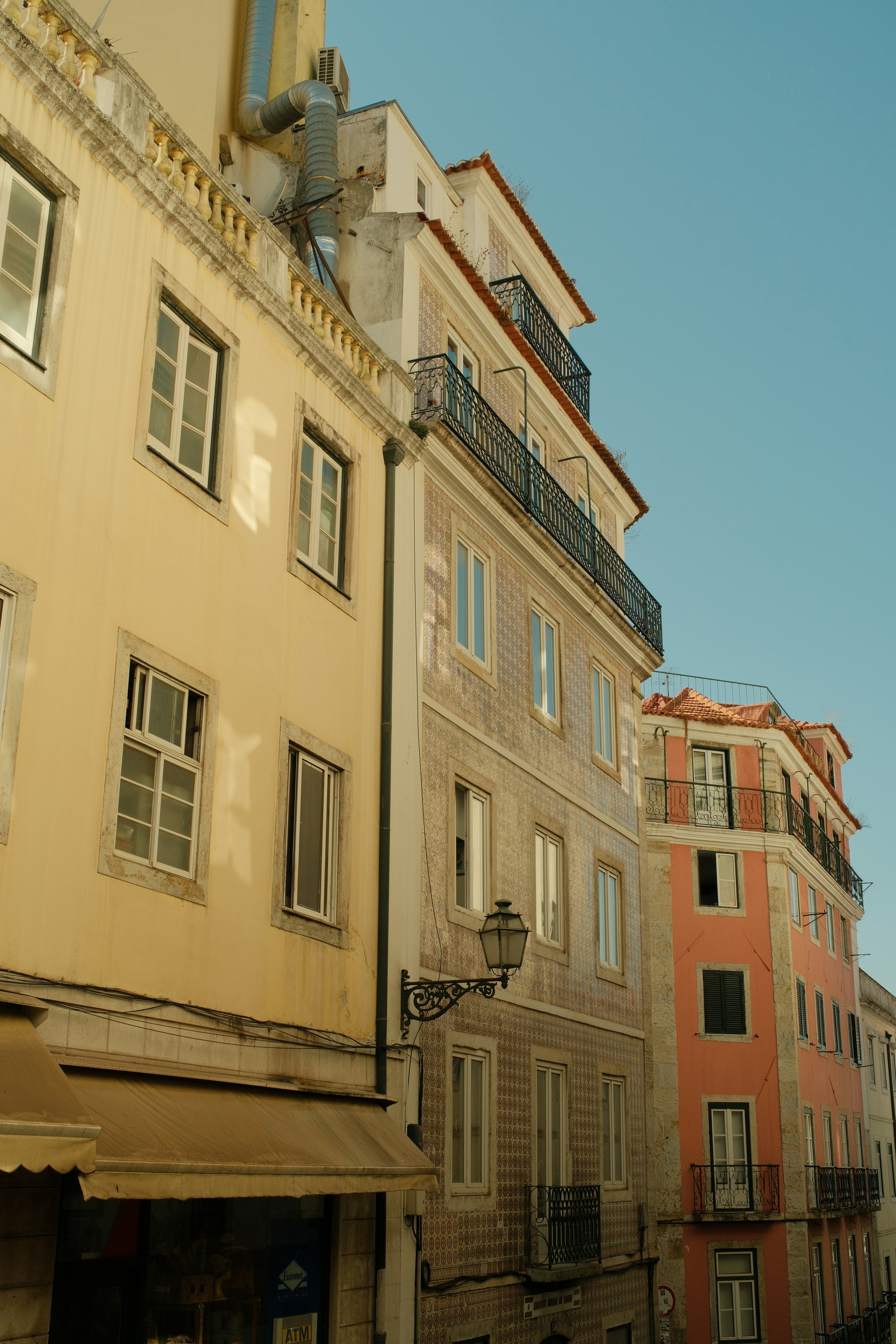Sunlit Facades on a Narrow European Street