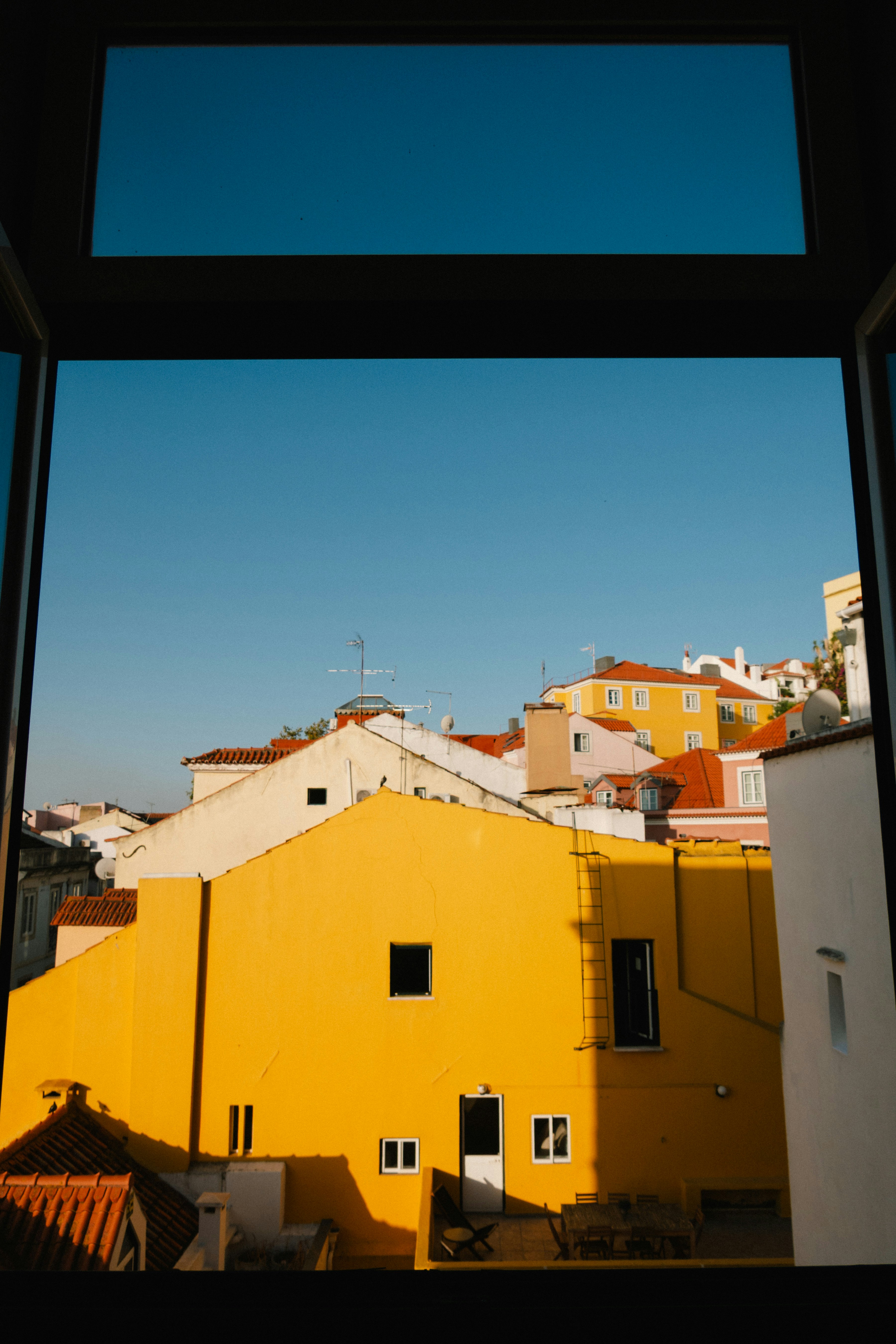 Warm Terrace Overlook in Sunlit Barrio
