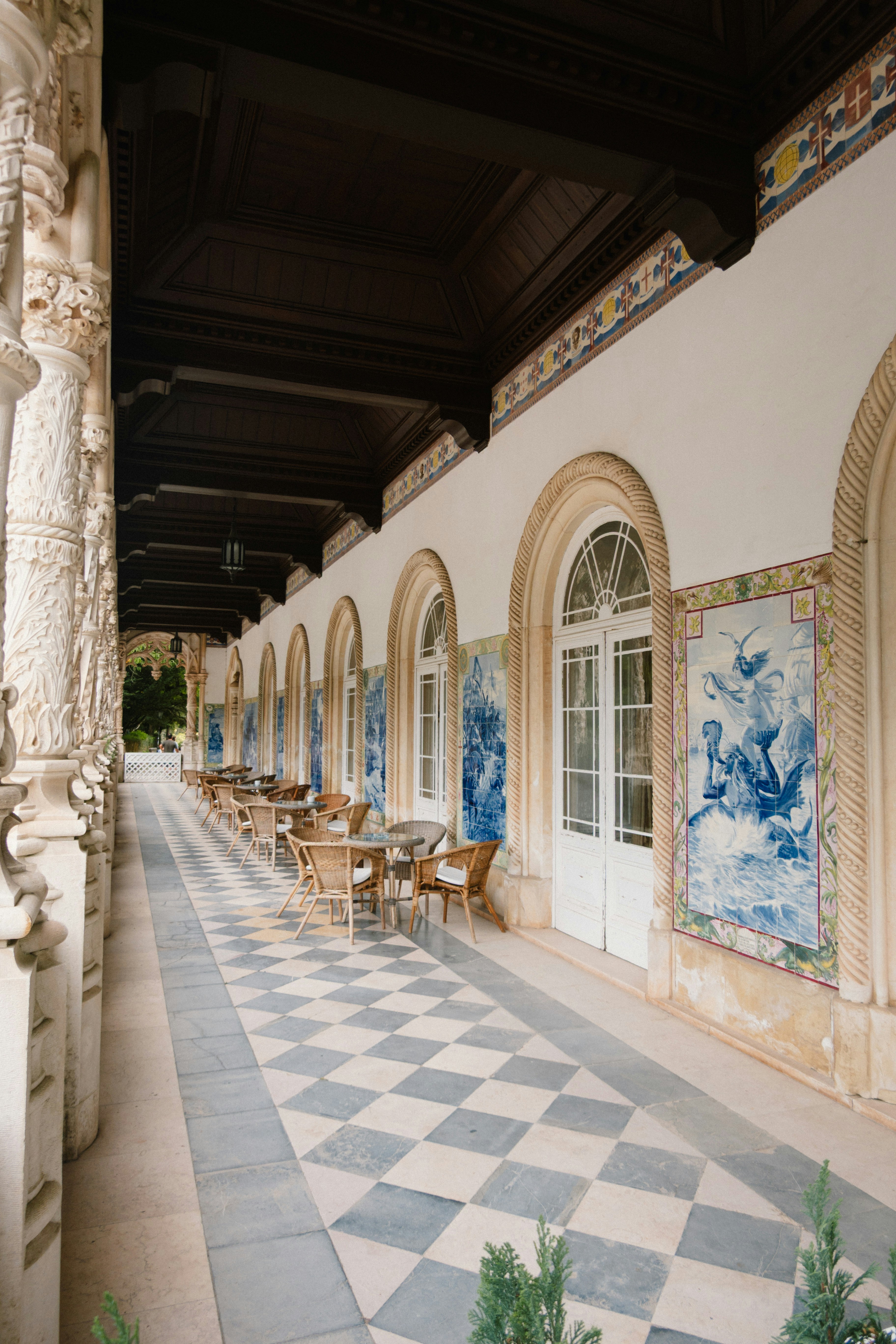 Arcade of Blue Tiles: A Colonnaded Terrace with Blue Tile Murals