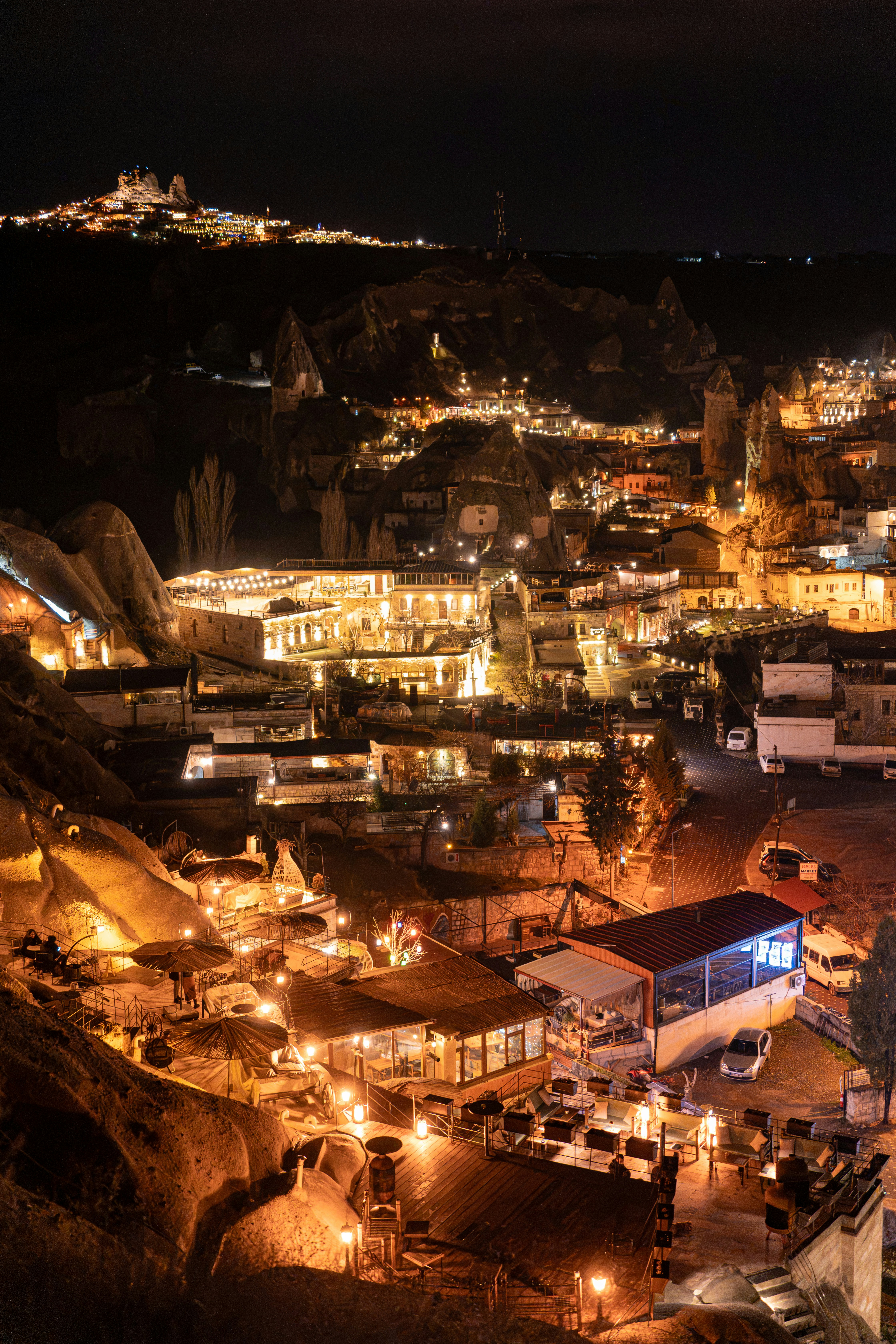 Luminous Village at Nightfall in a Cappadocian Valley