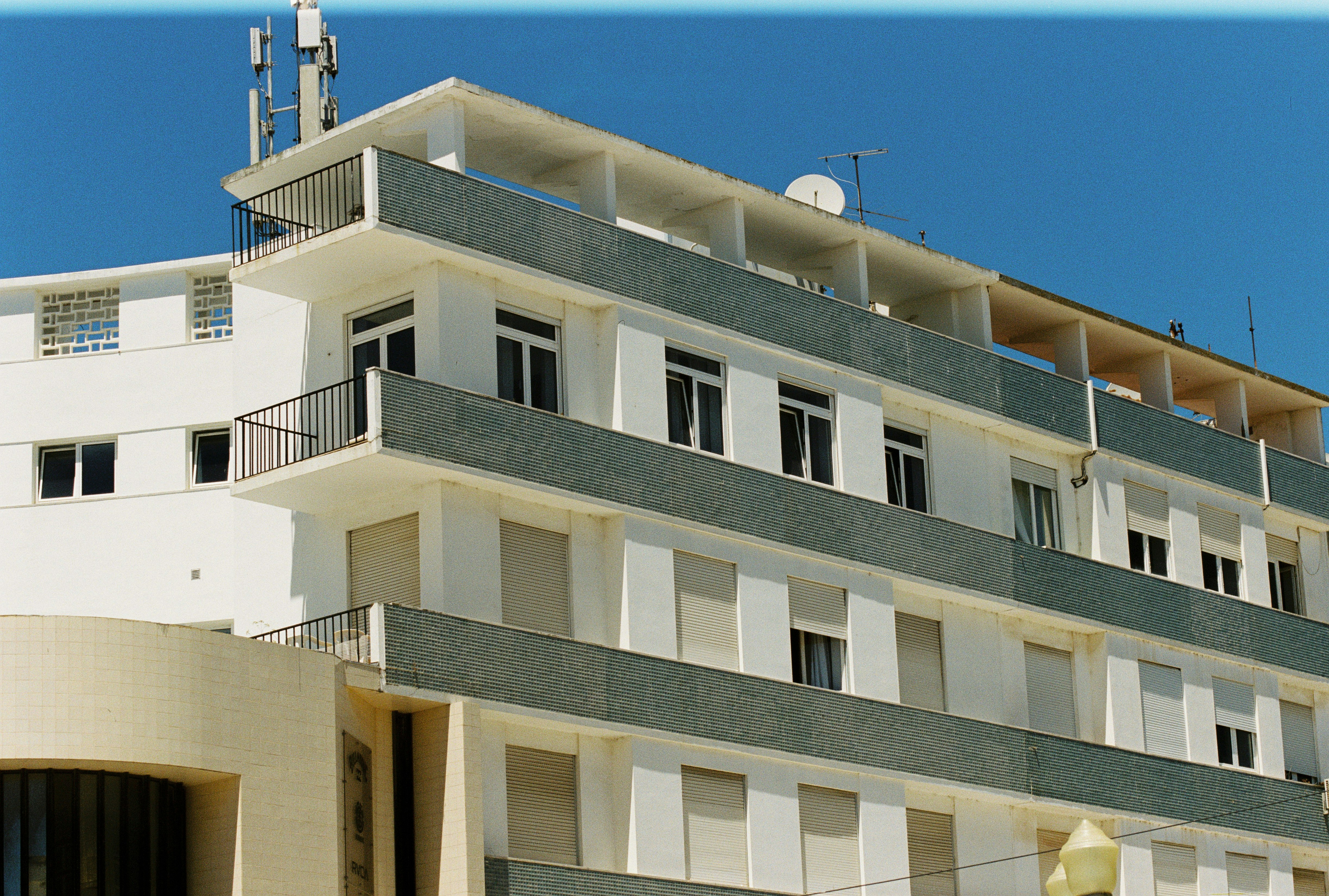 White-Trimmed Residence Reaches for the Sky