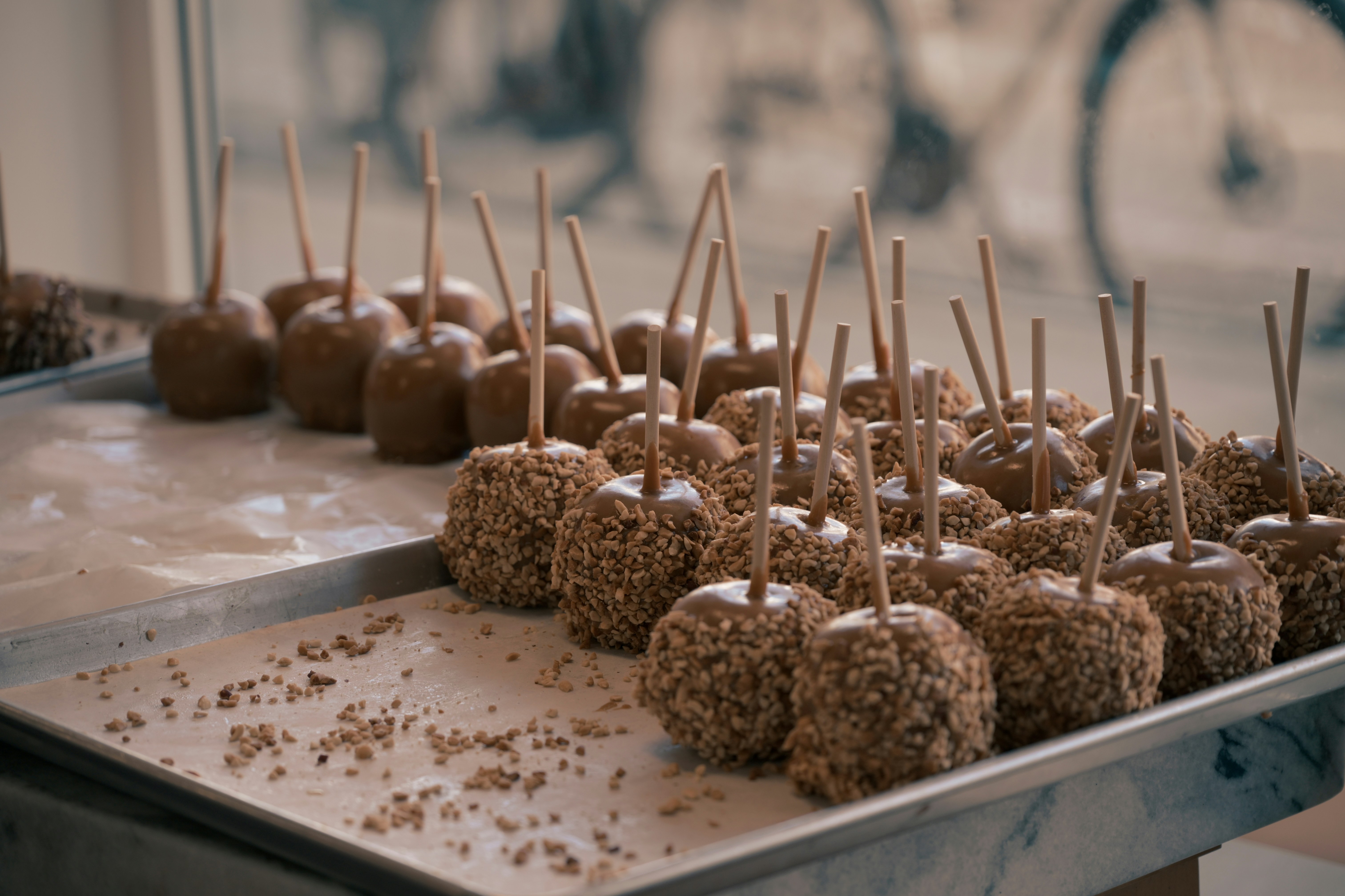 Sugared Sphere Brigade: Cocoa-coated Cake Pops in a Shimmering Display