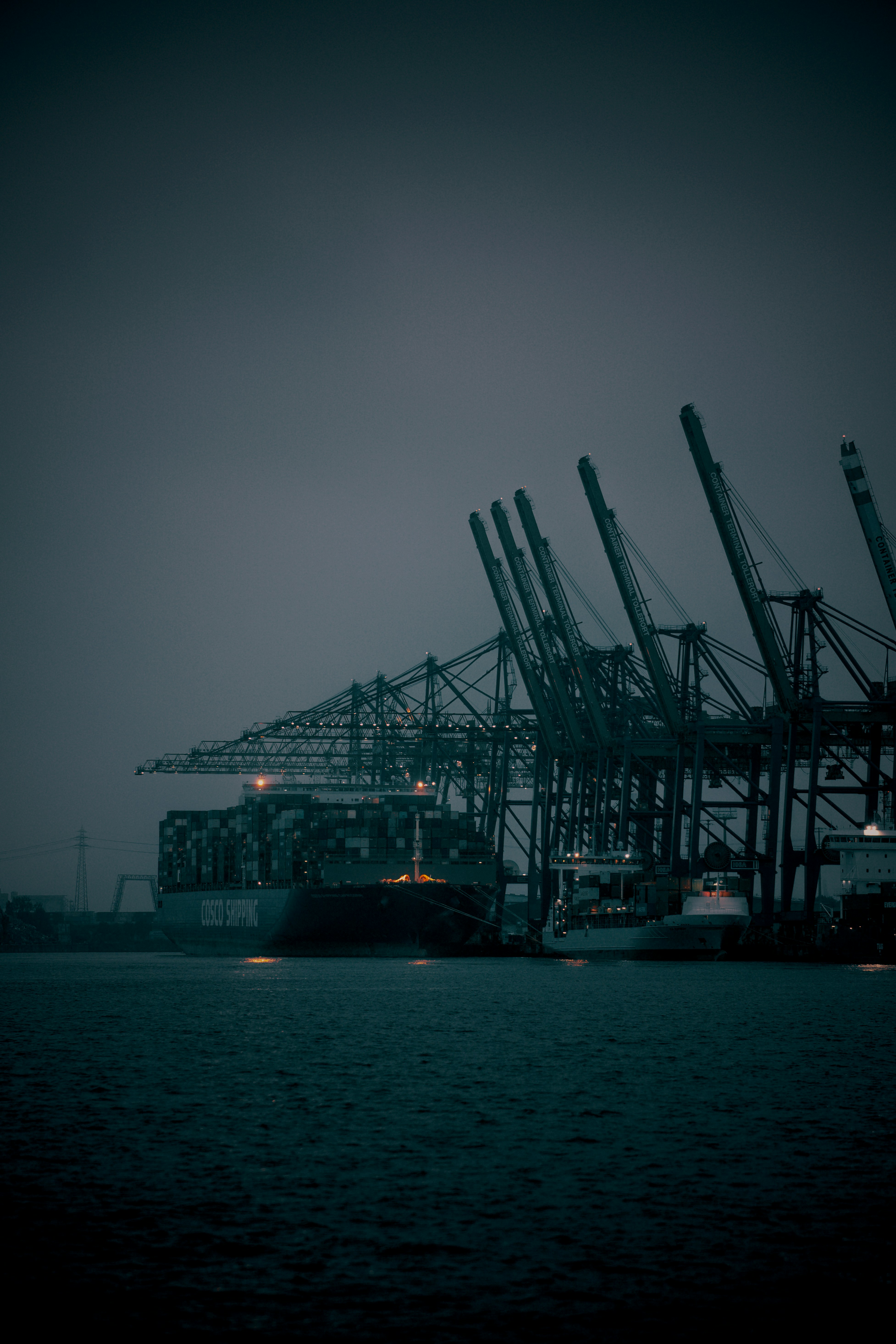 Moonlit Crane Row at the Port